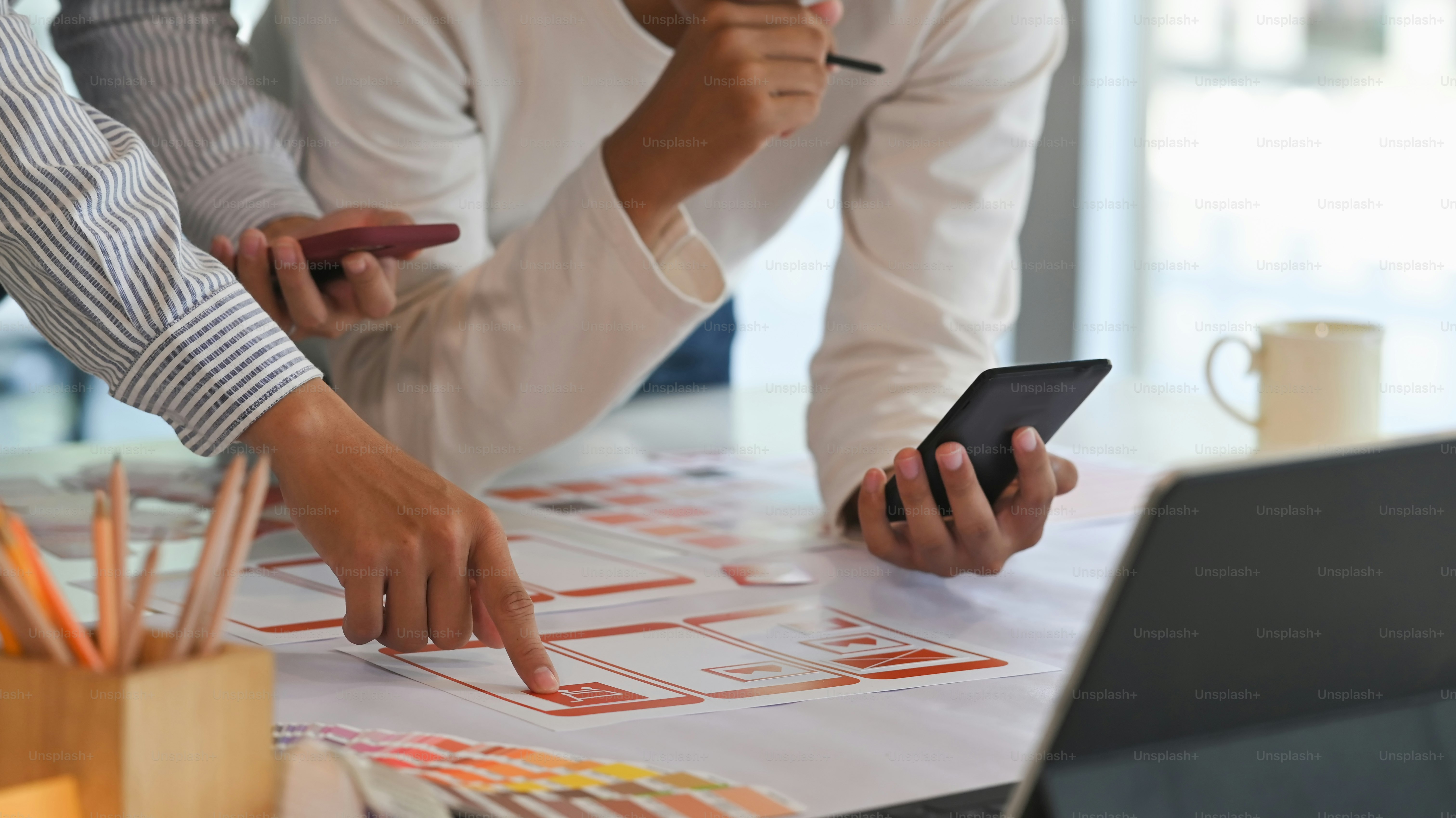 Cropped shot of Ux Ui creative team while planning/brainstorming on the ...