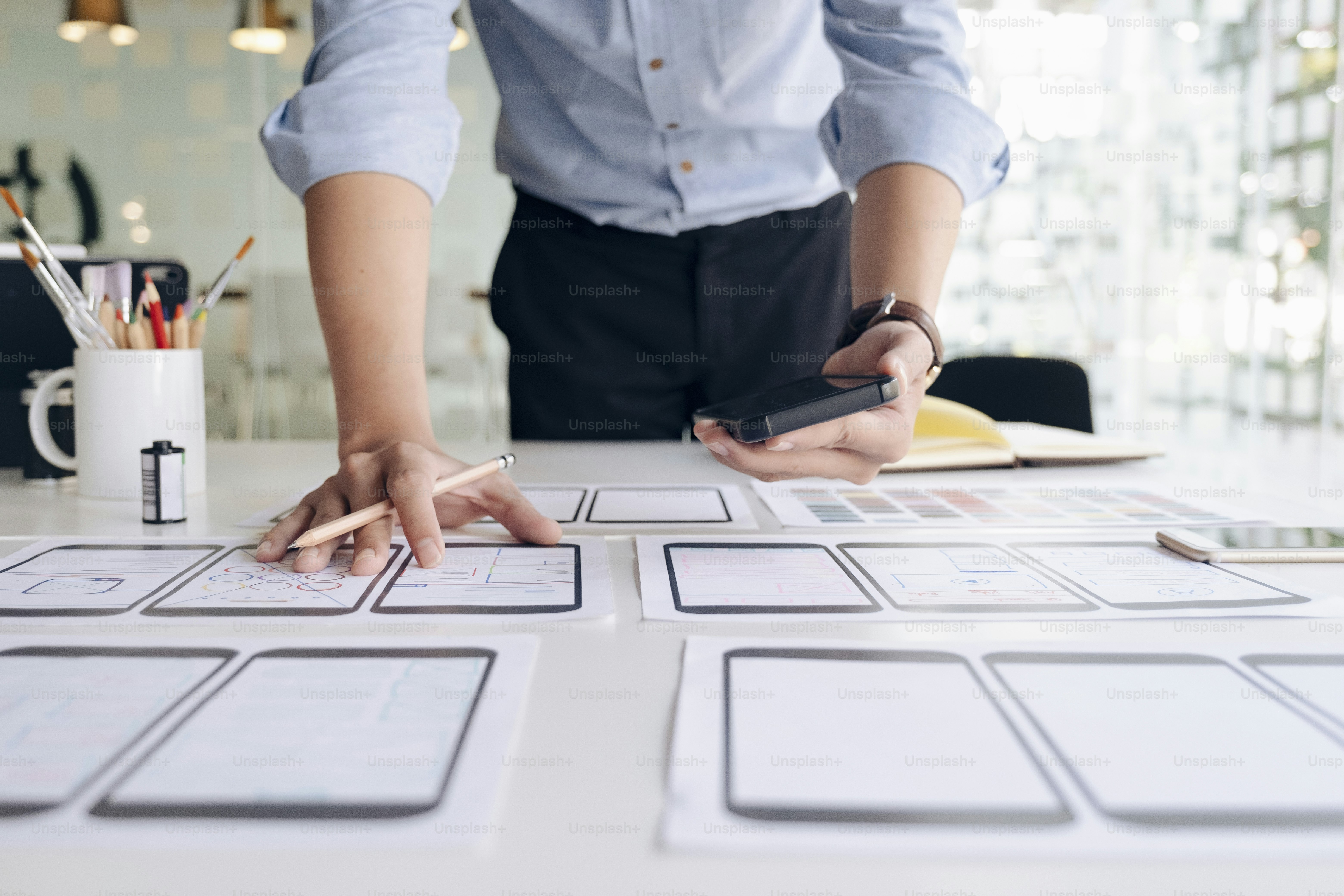 Programmer and UX UI designer working in a software development and ...