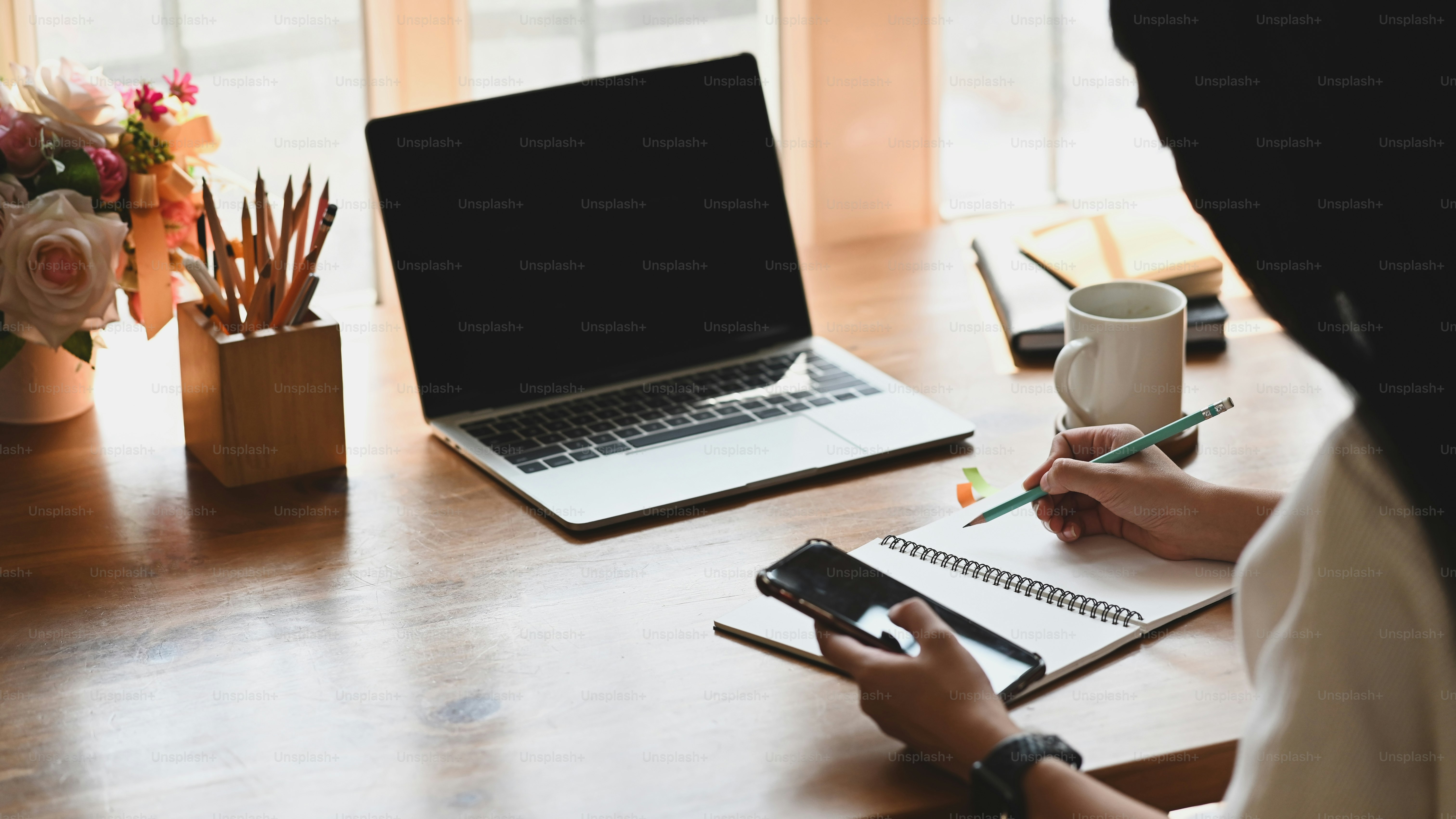 Cropped shot of young beautiful writer making up the story while ...