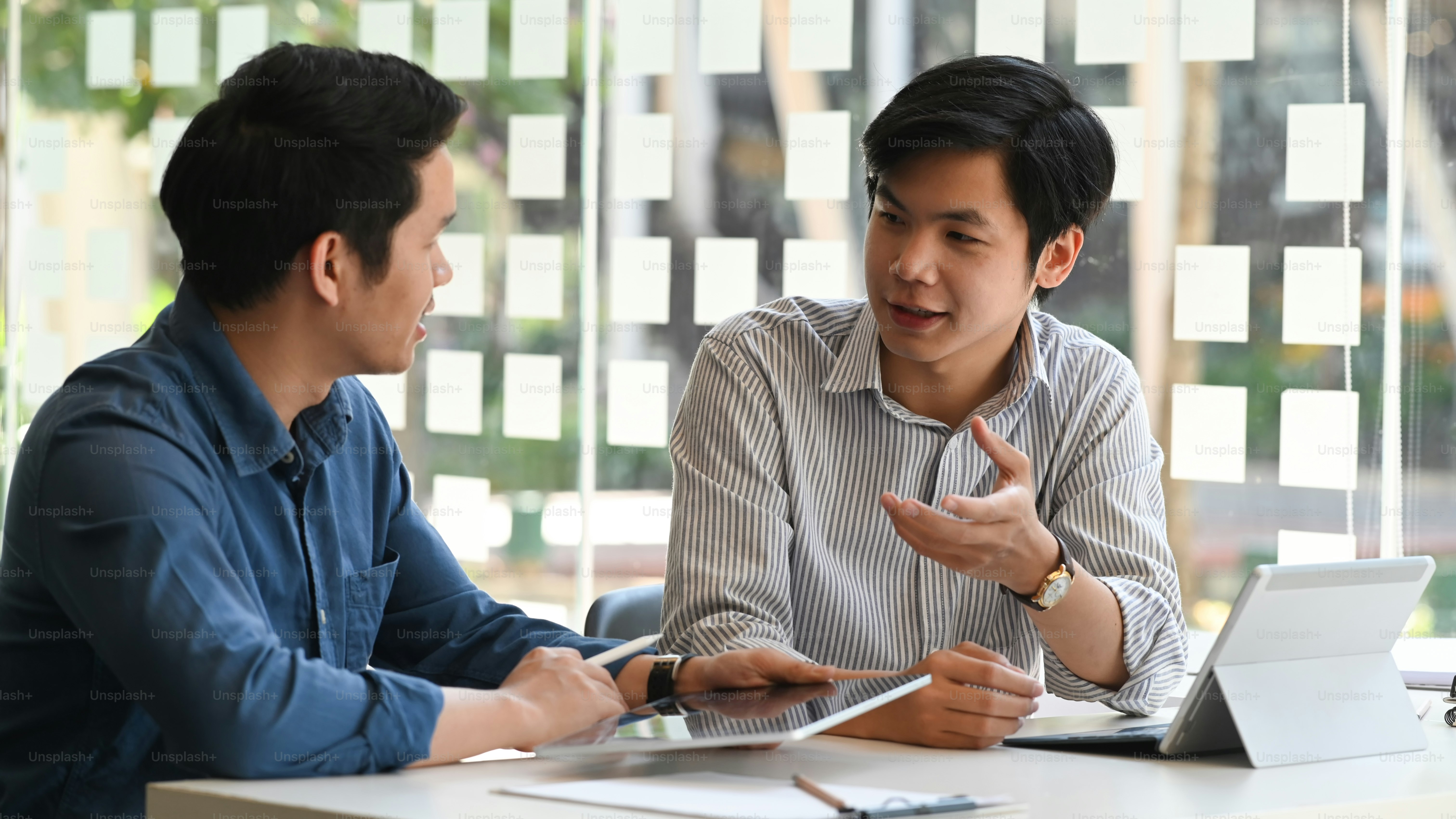 A business development team discussing at the modern office. photo ...