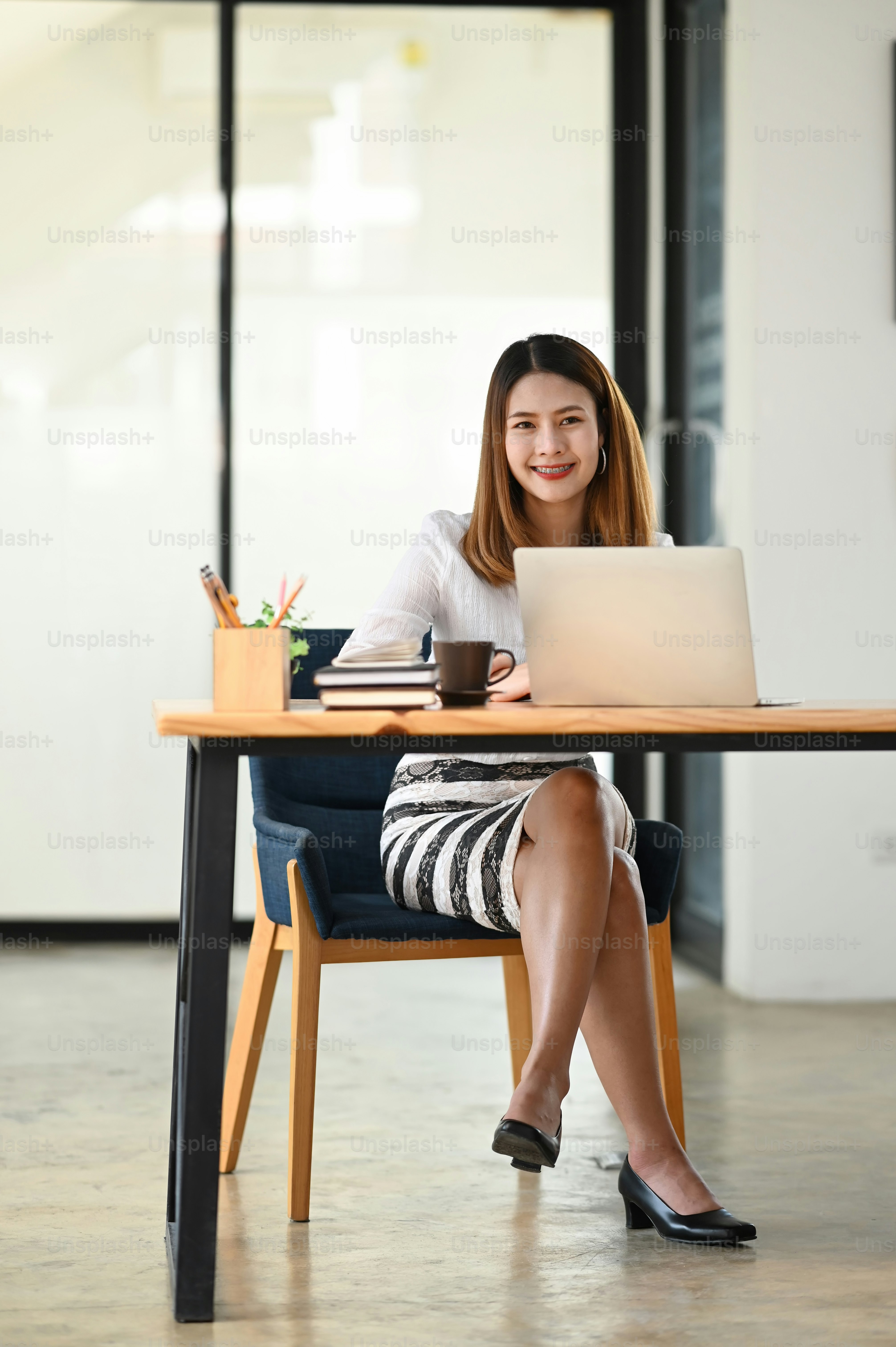 Photo of beautiful woman working as secretary sitting and smiling at ...