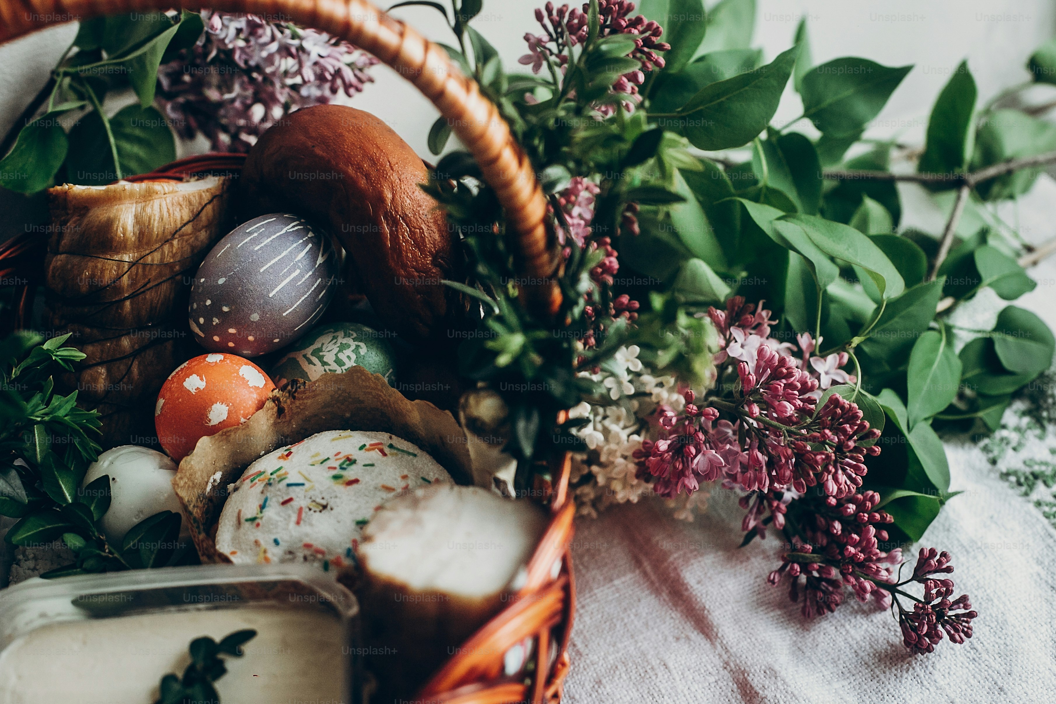 Happy easter. easter basket with cake and eggs ham food. colorful ...