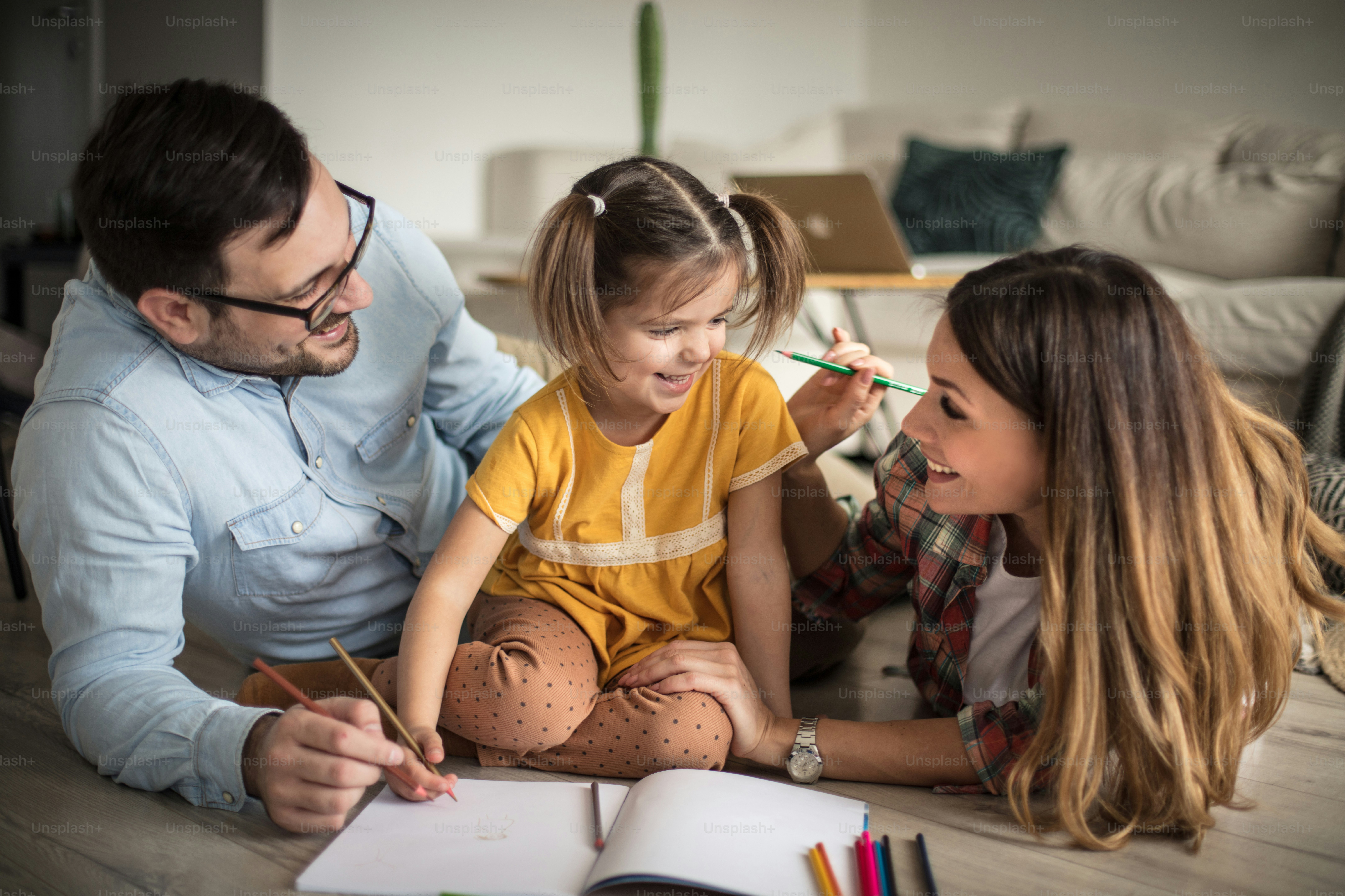 Thank you mom. Family at home. Mother and helping her daughter with ...