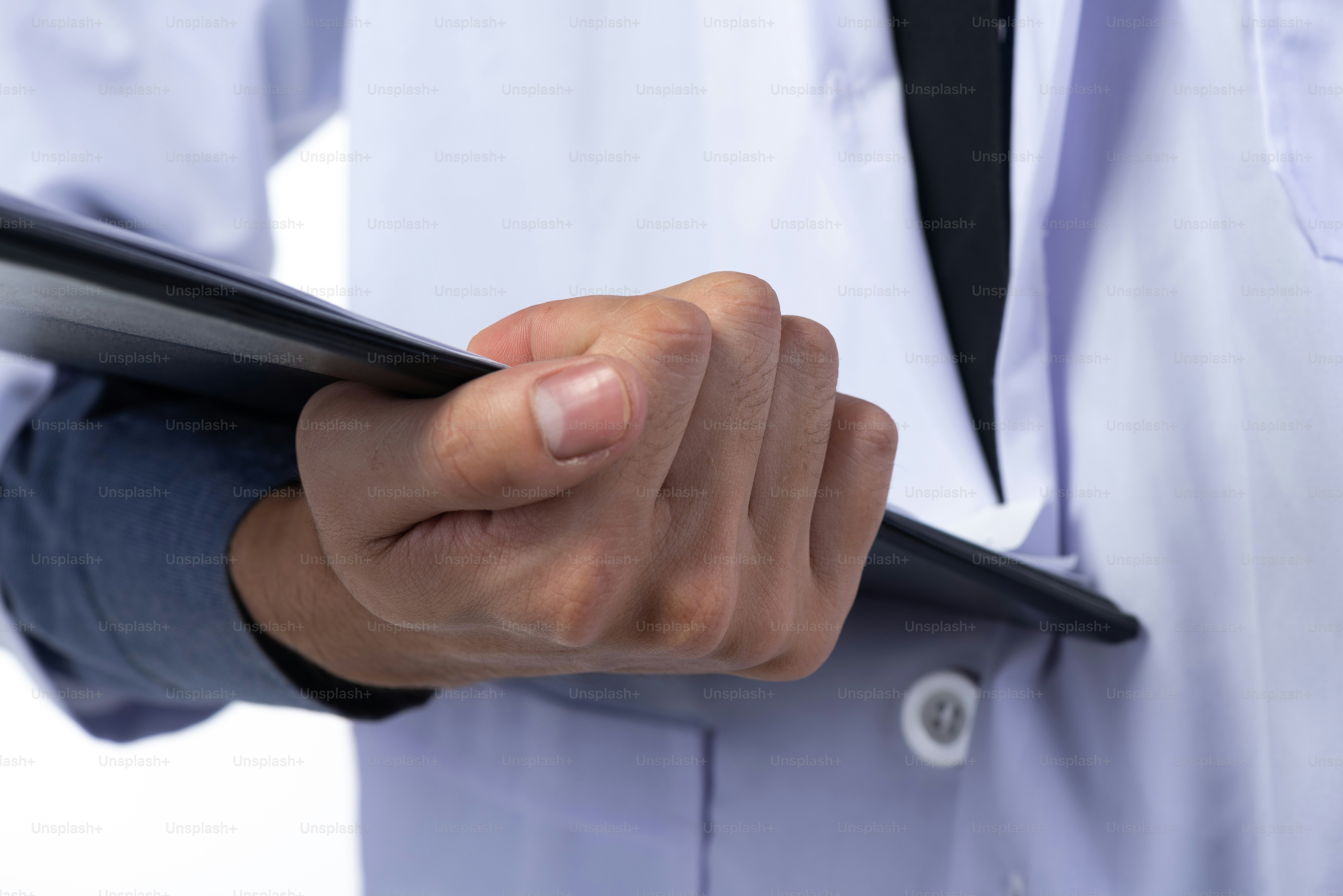 Doctors with medical data analysis sheet, isolated on white photo ...