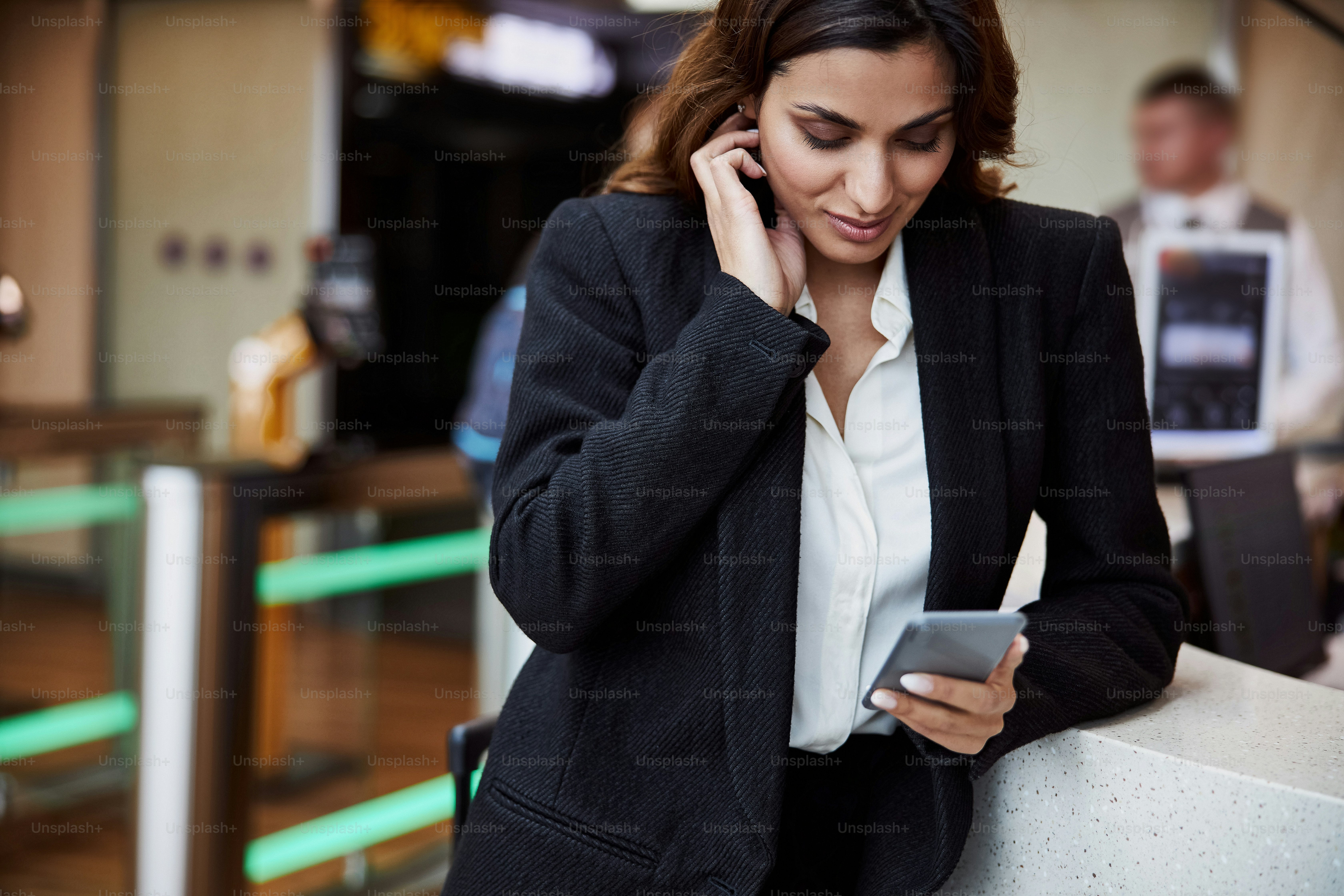 Beautiful young woman walking through automated airport border gates ...