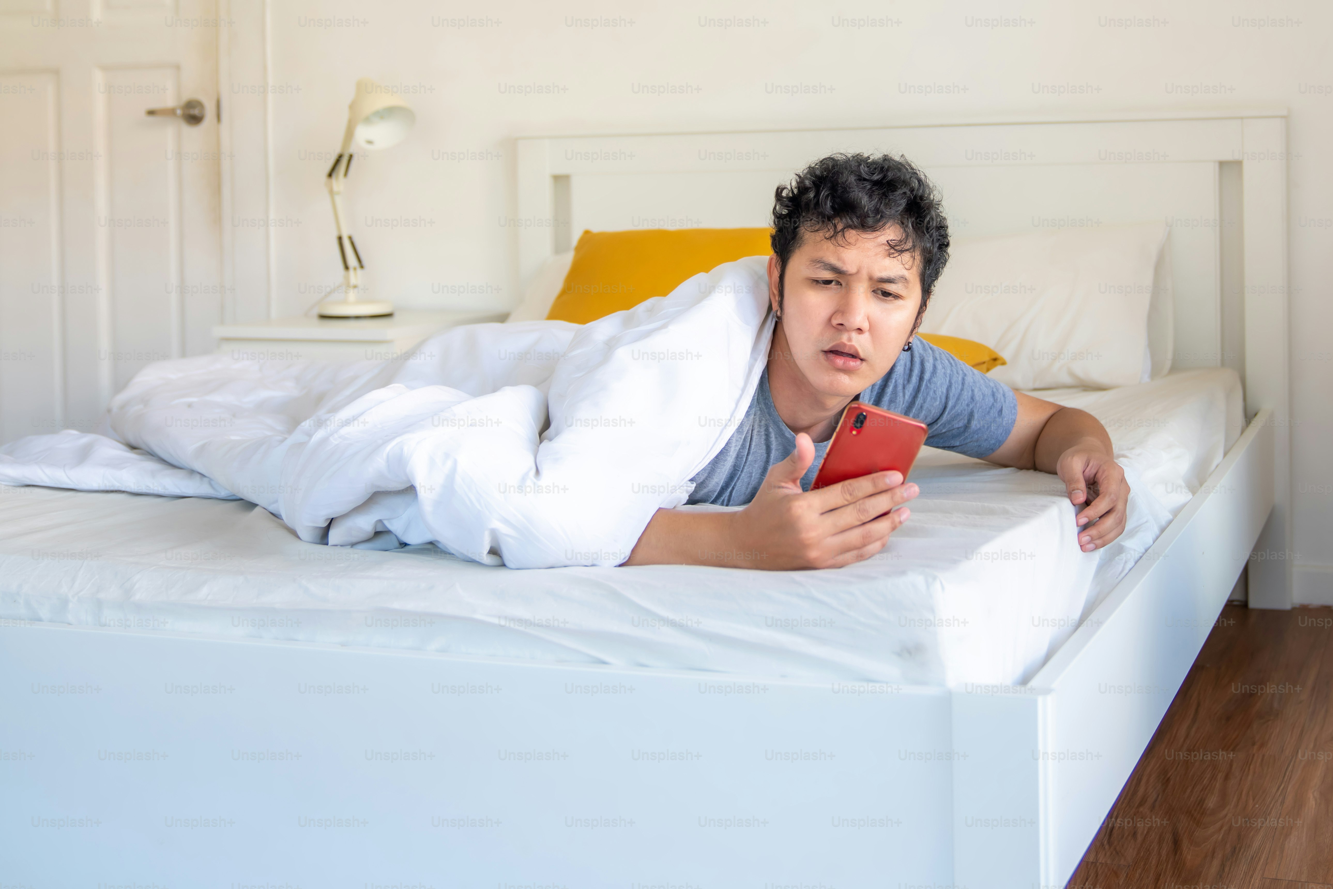 Asian man wake up late in the morning photo – Checking Image on Unsplash
