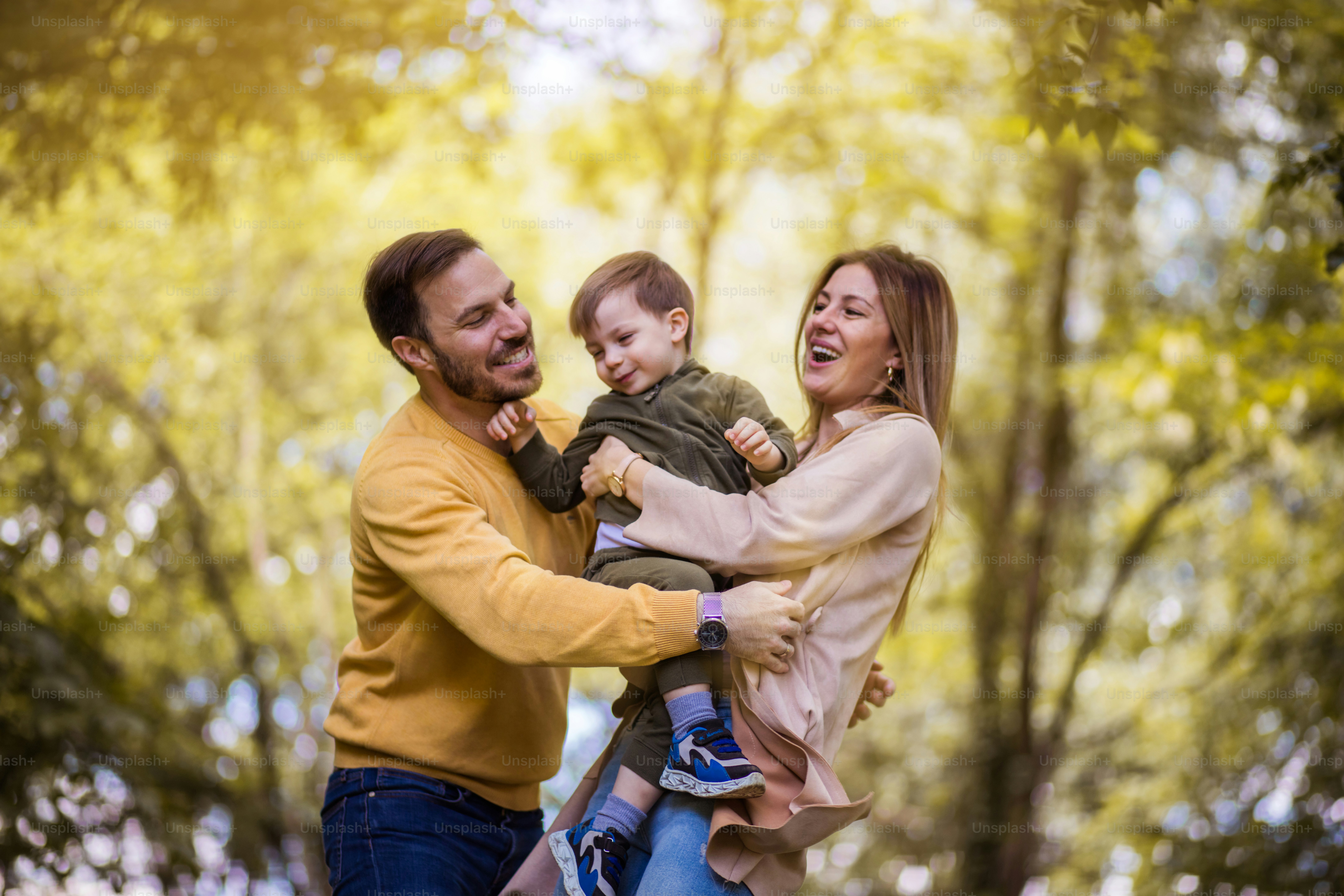 Triple times the happiness in our family. Parents spending time with ...