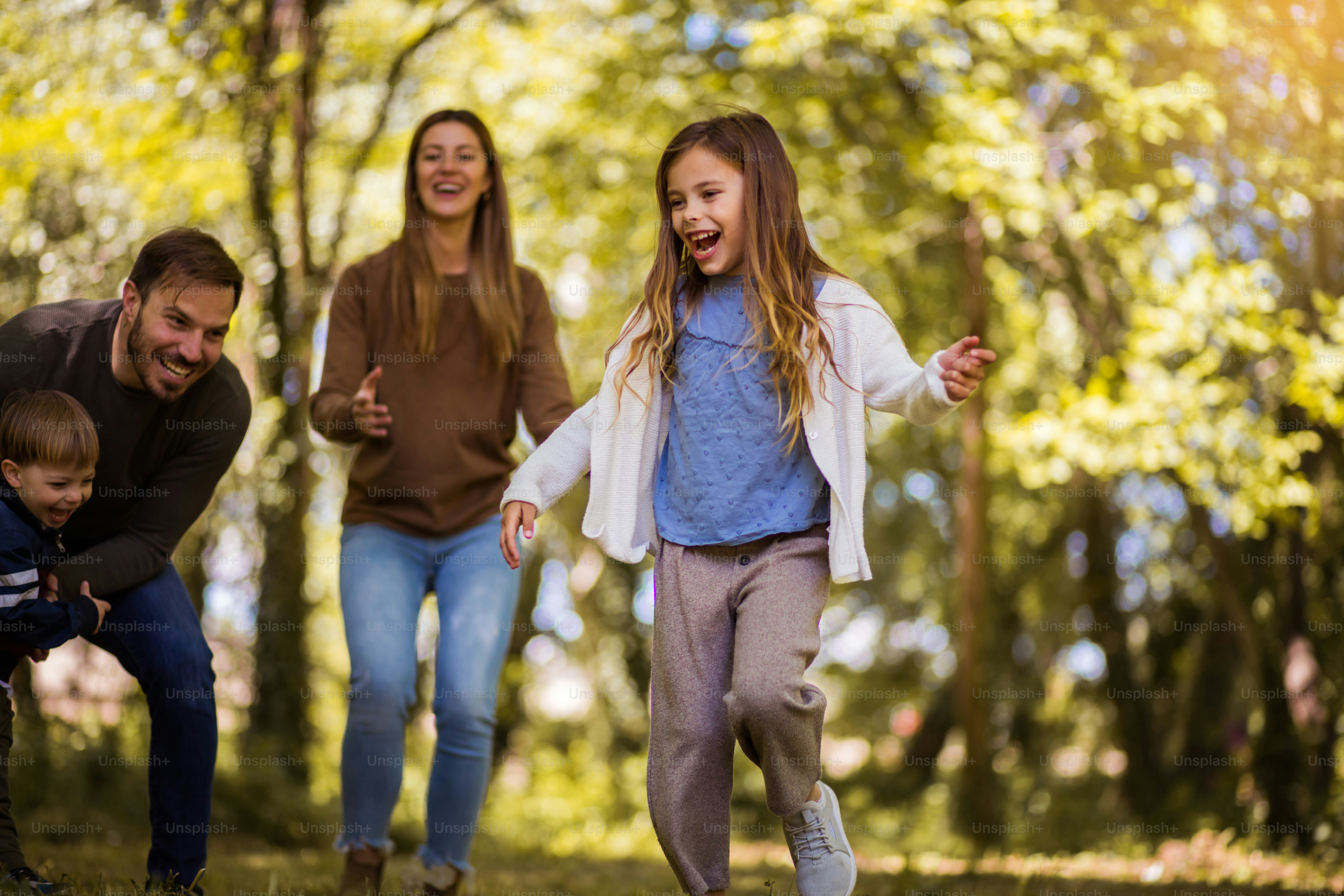 Time for a family adventure. Parents spending time with their children ...