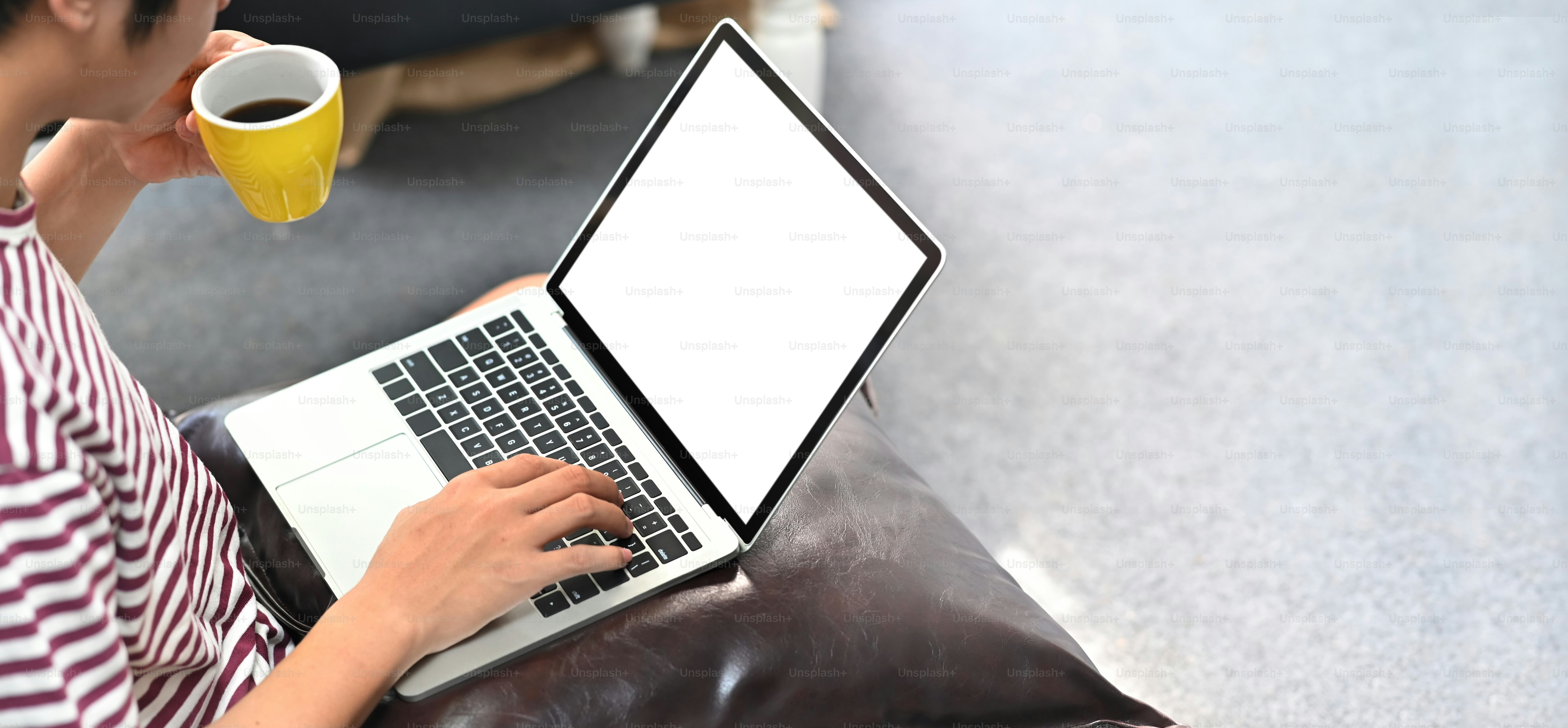 Close-up creative man working with white blank screen computer laptop ...