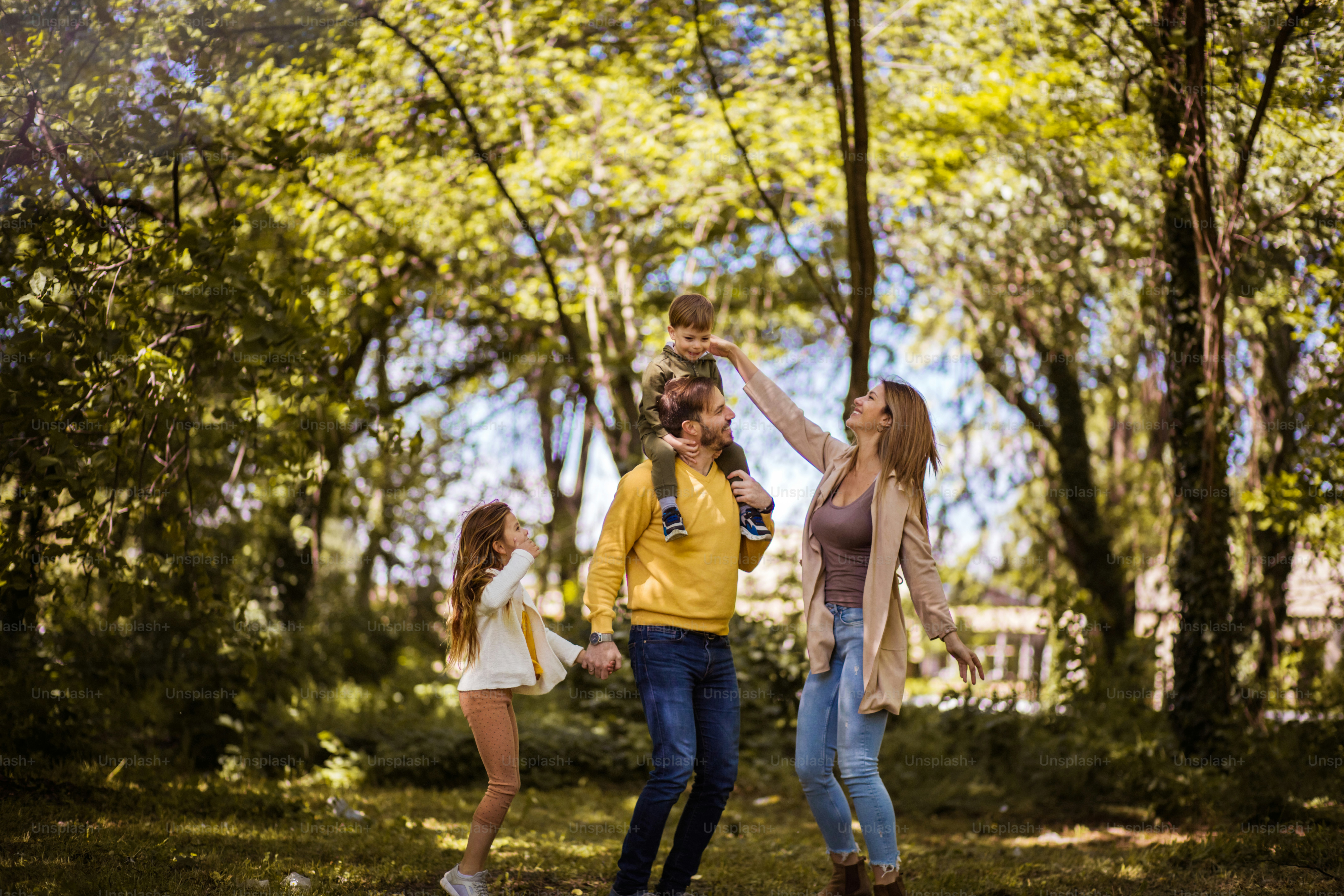 Summer adventure. Parents spending time with their children outside ...