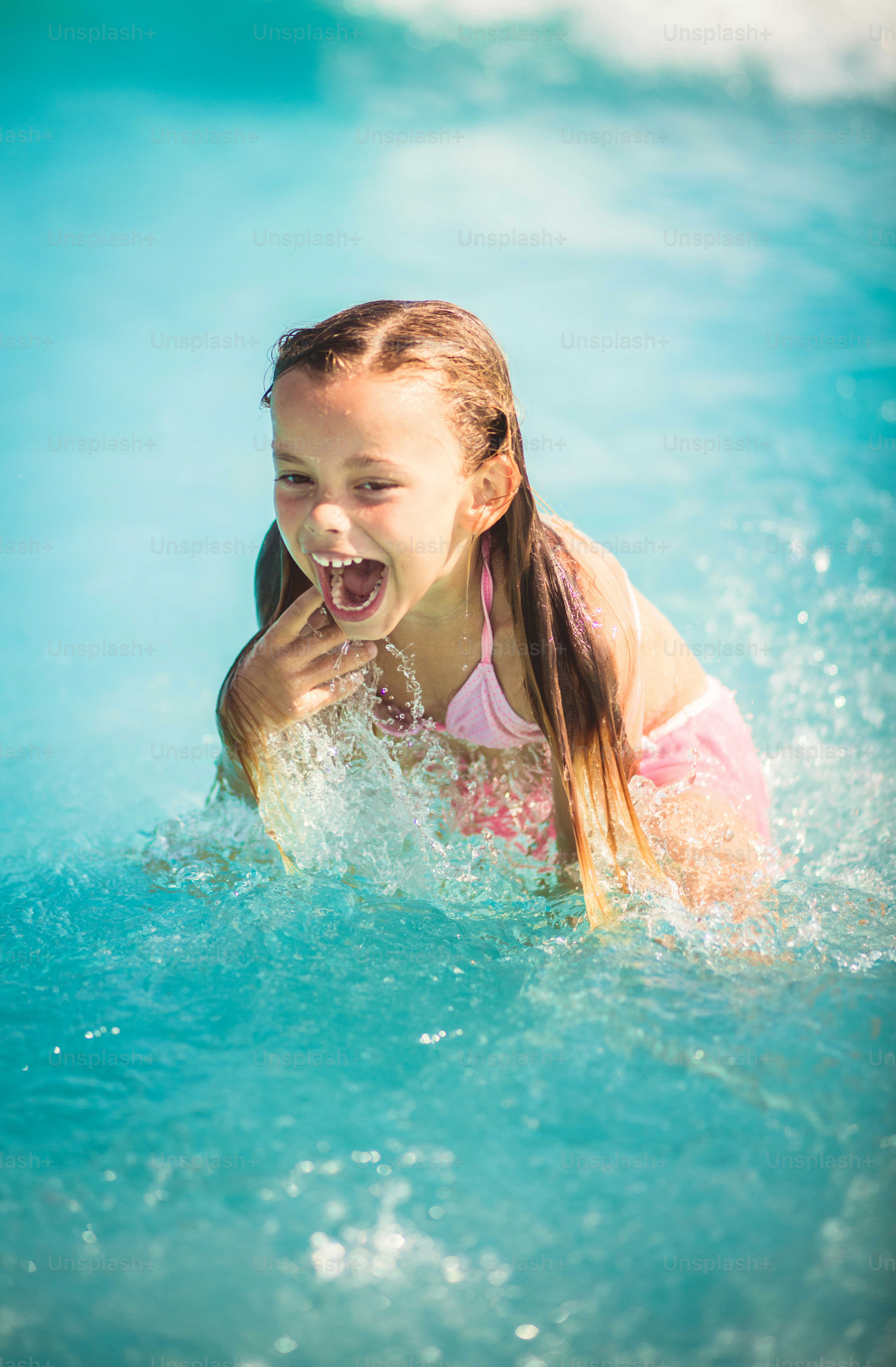 Swim and feeling good. Child swimming in the pool. photo – Swimming ...