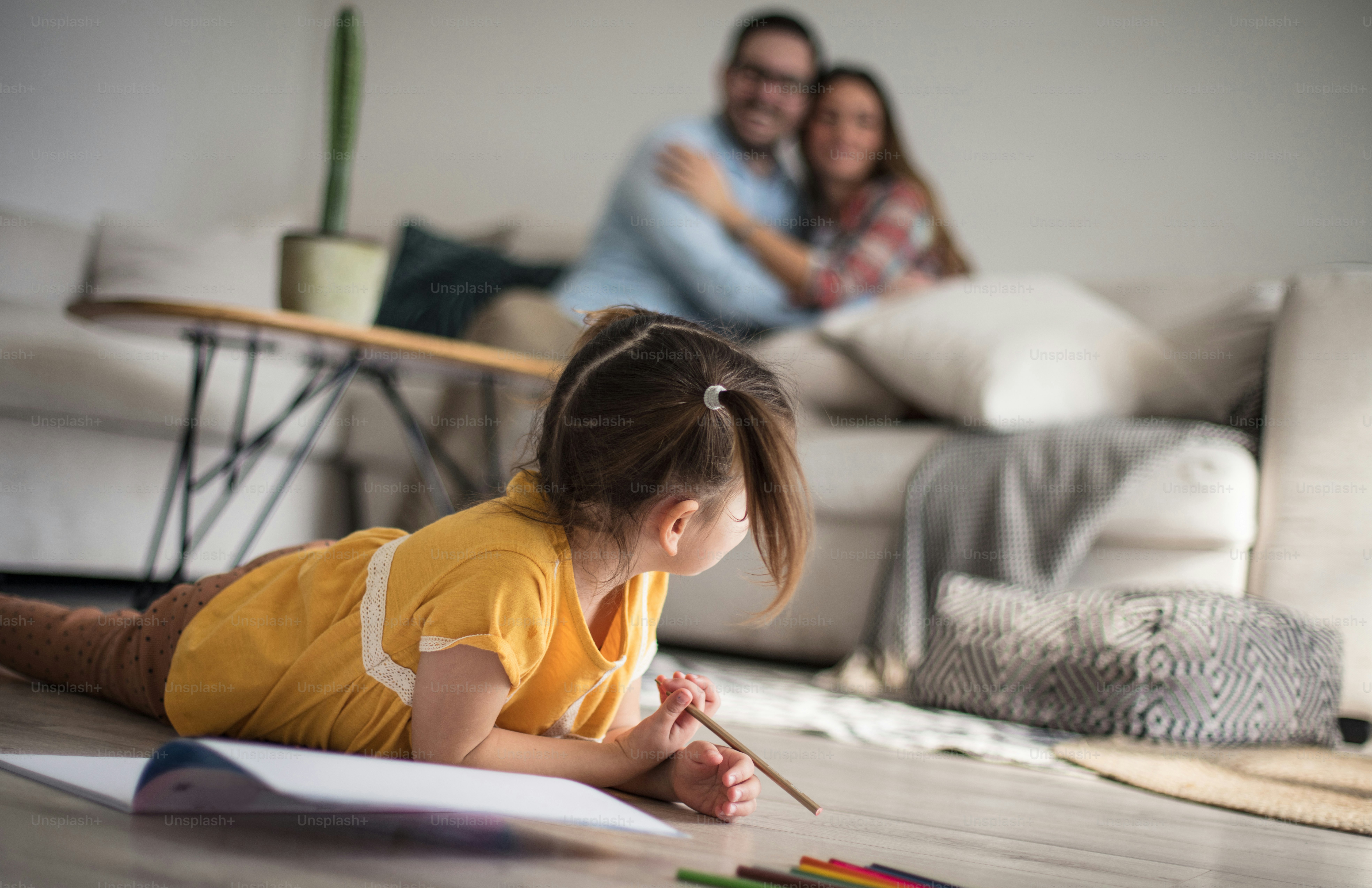 It's time to do homework. Little girl at home doing homework. photo ...