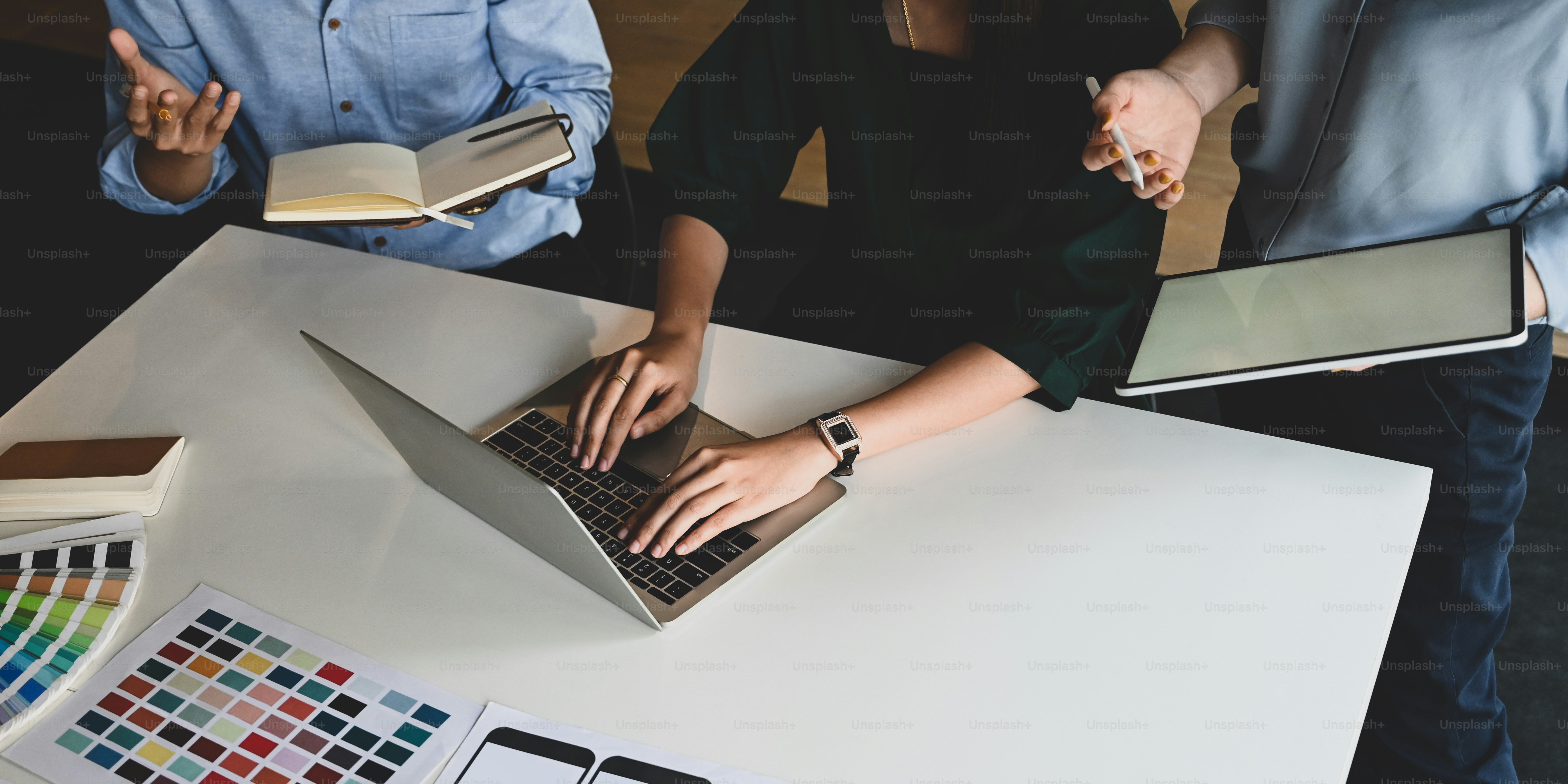 Top view image of graphic designing team working together and ...