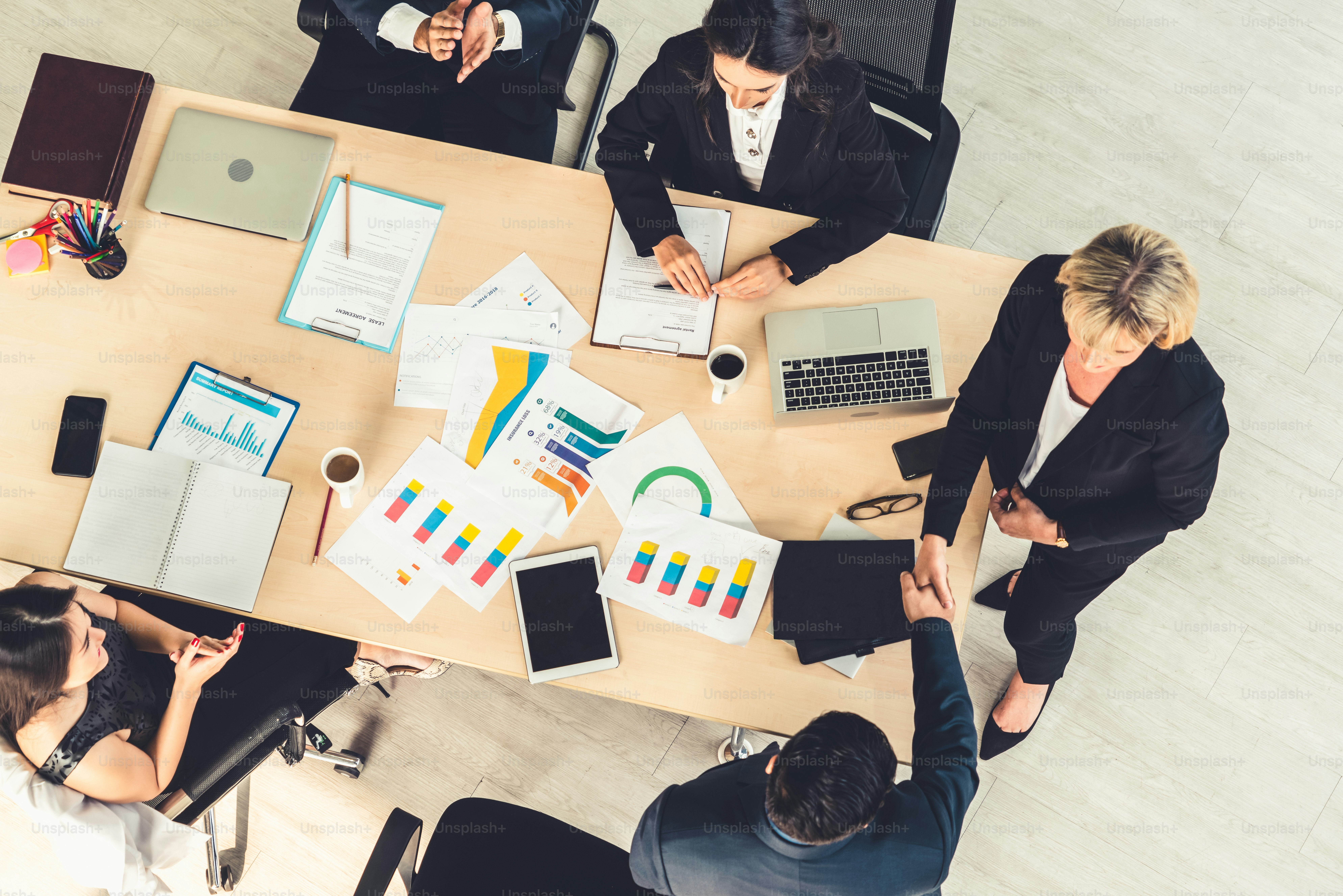 Business people group meeting shot from top view in office . Profession ...