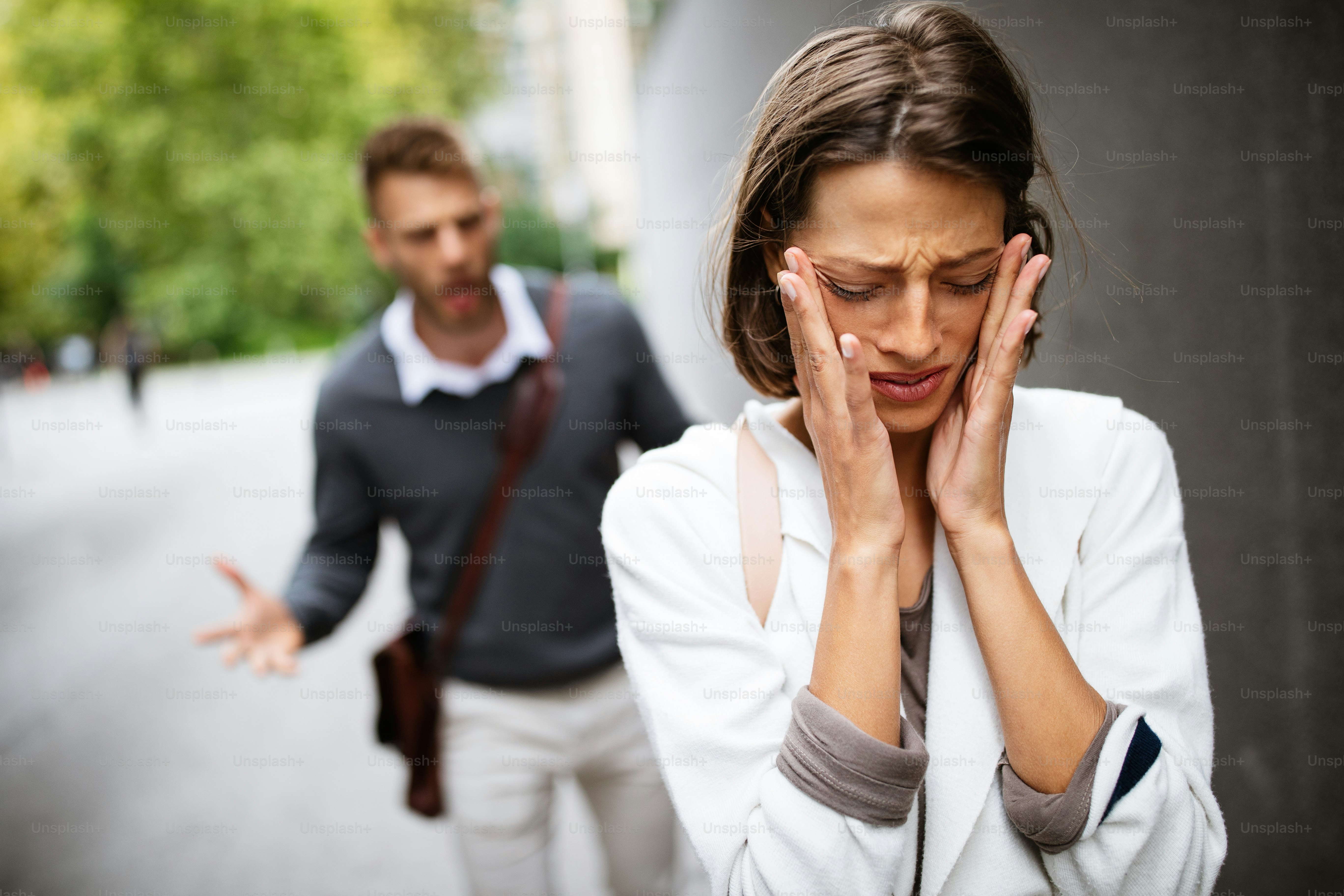 Frustrated couple arguing and having marriage problems outdoor photo ...