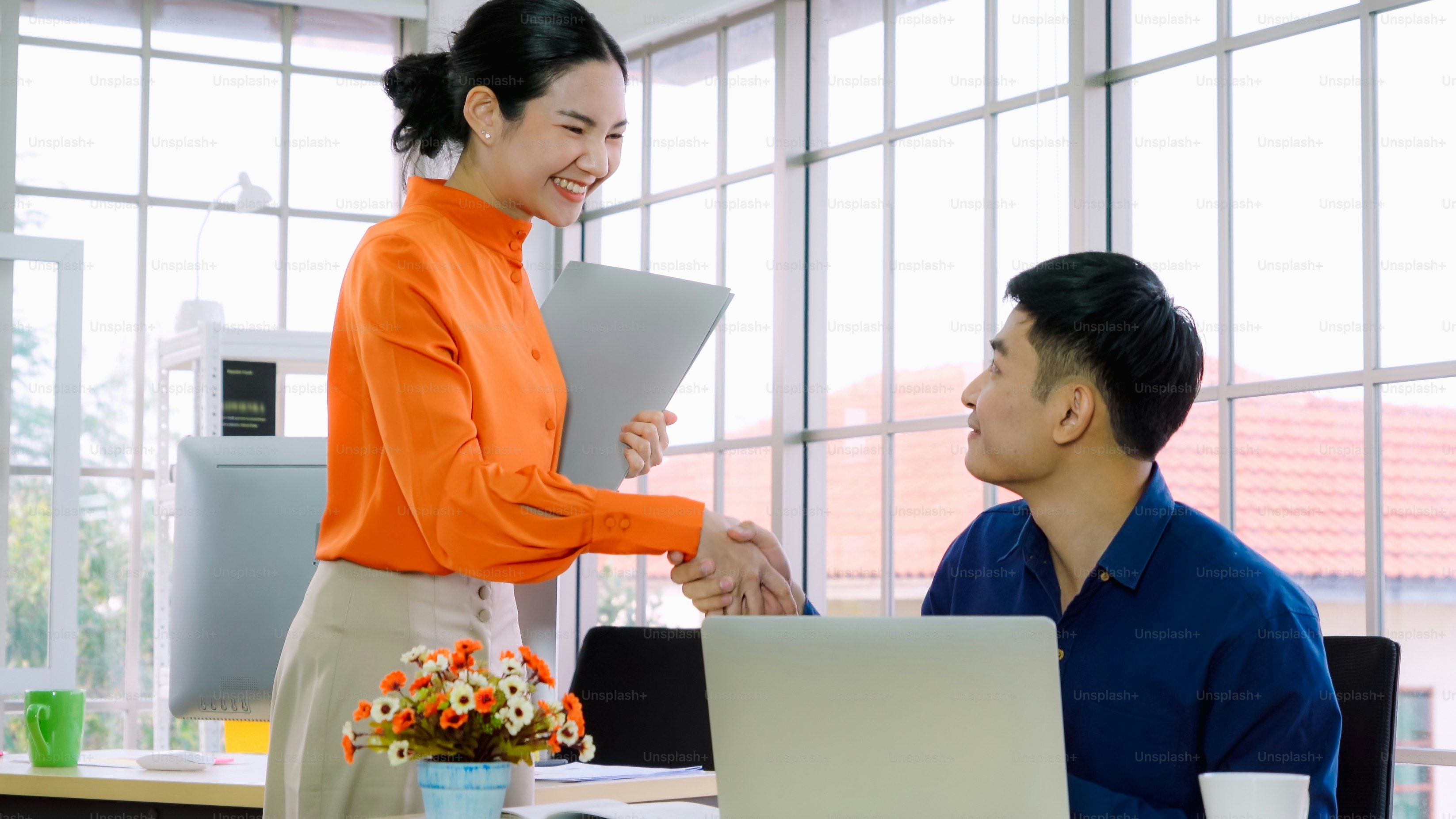 Business people handshake with friend at office showing trust ...