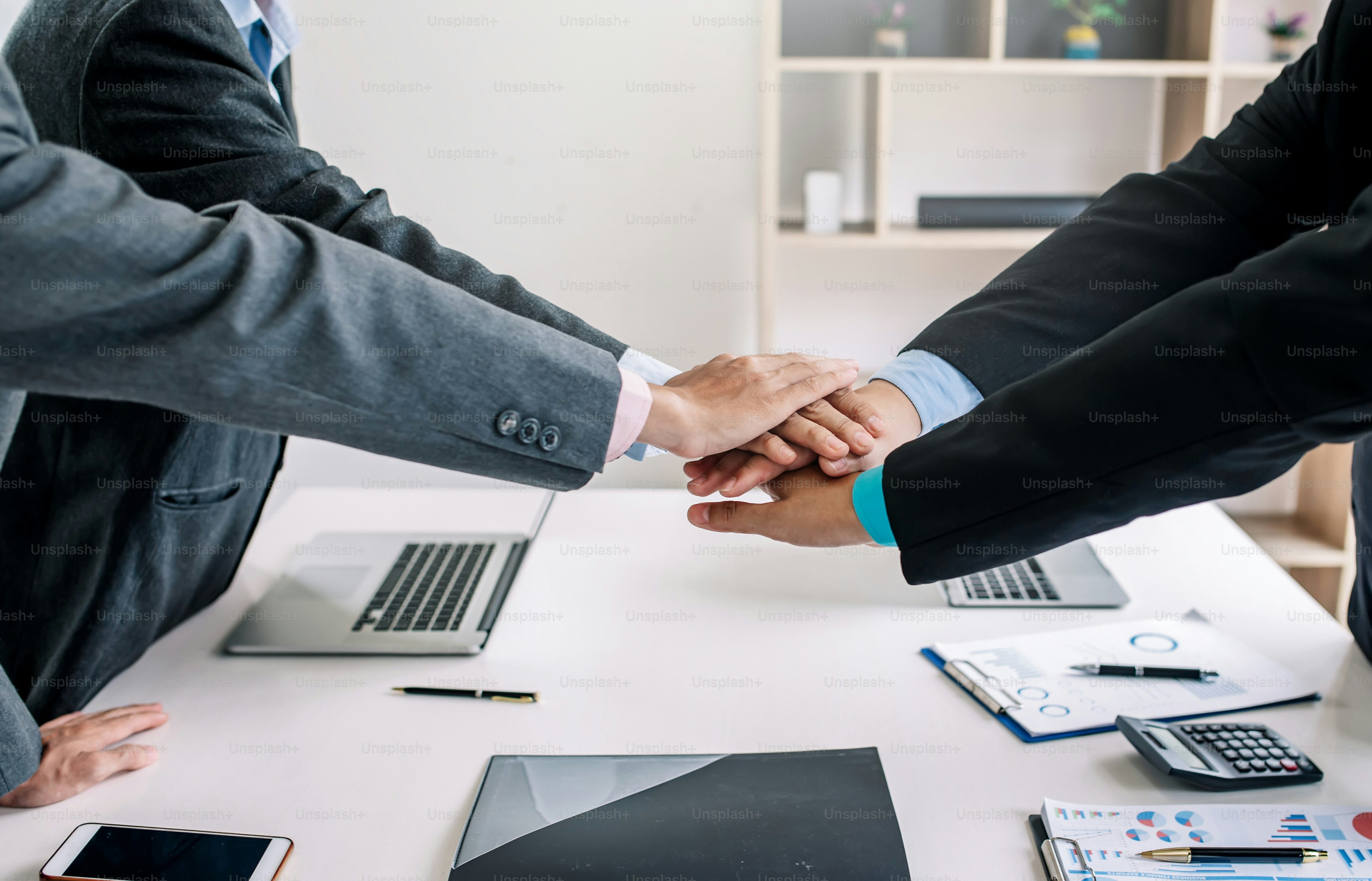 Group of business people with unity working together as a team ...