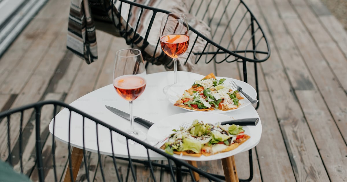 Homemade Pizza And Aperol Drink On Modern Wooden Terrace Dinner For Two Delicious Pizza And