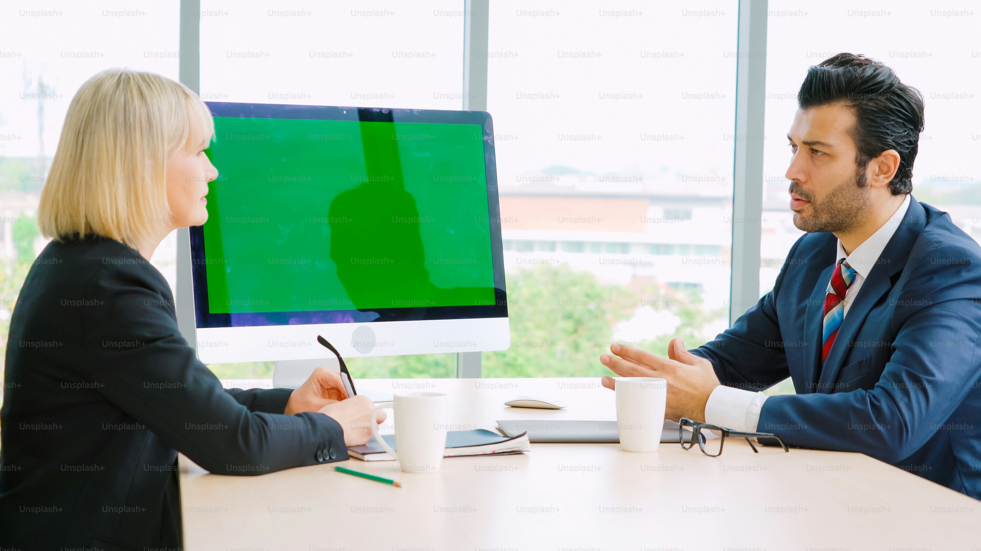 Business people in the conference room with green screen chroma key TV ...