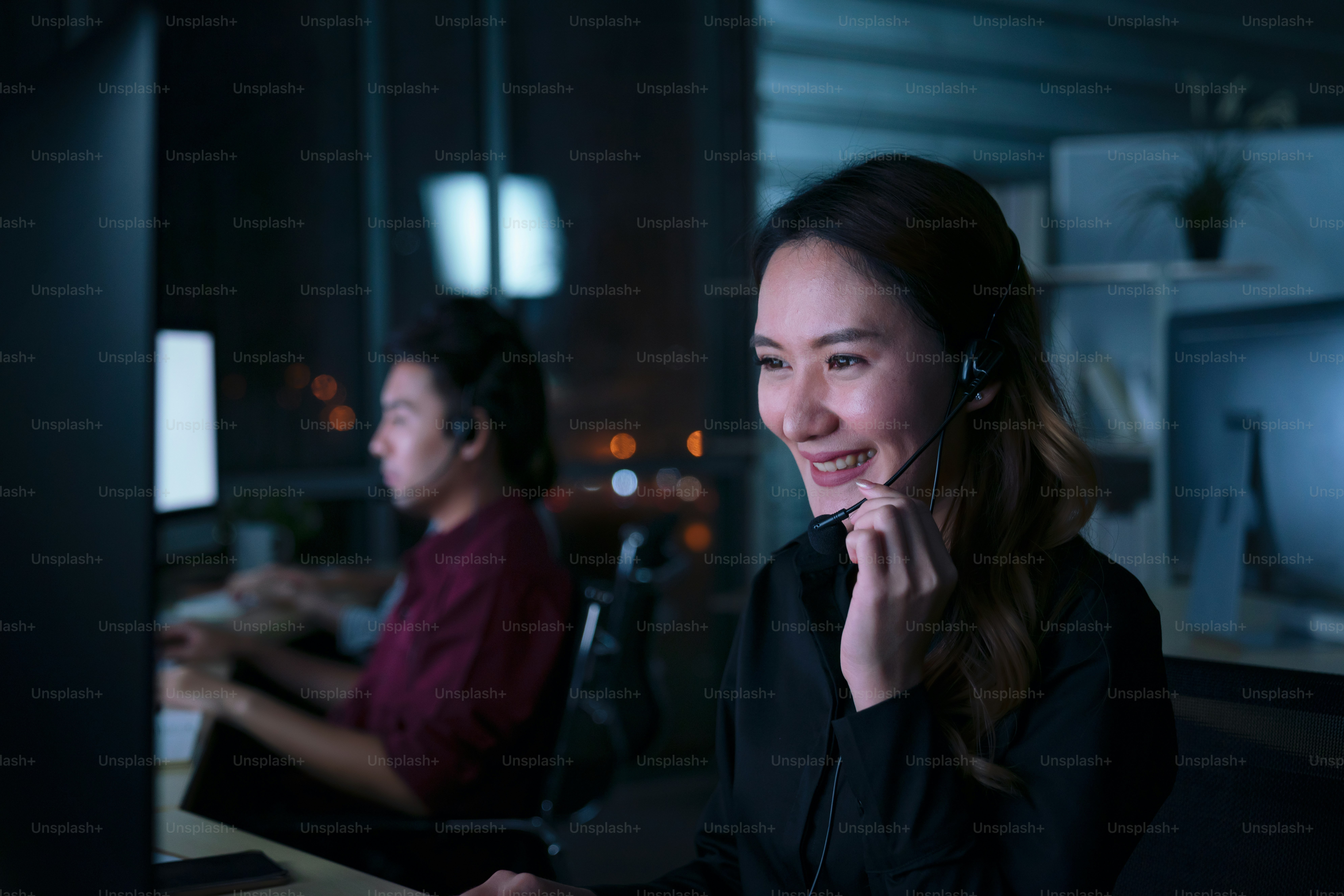 Young Thai Asian customer services care operators working night shift ...