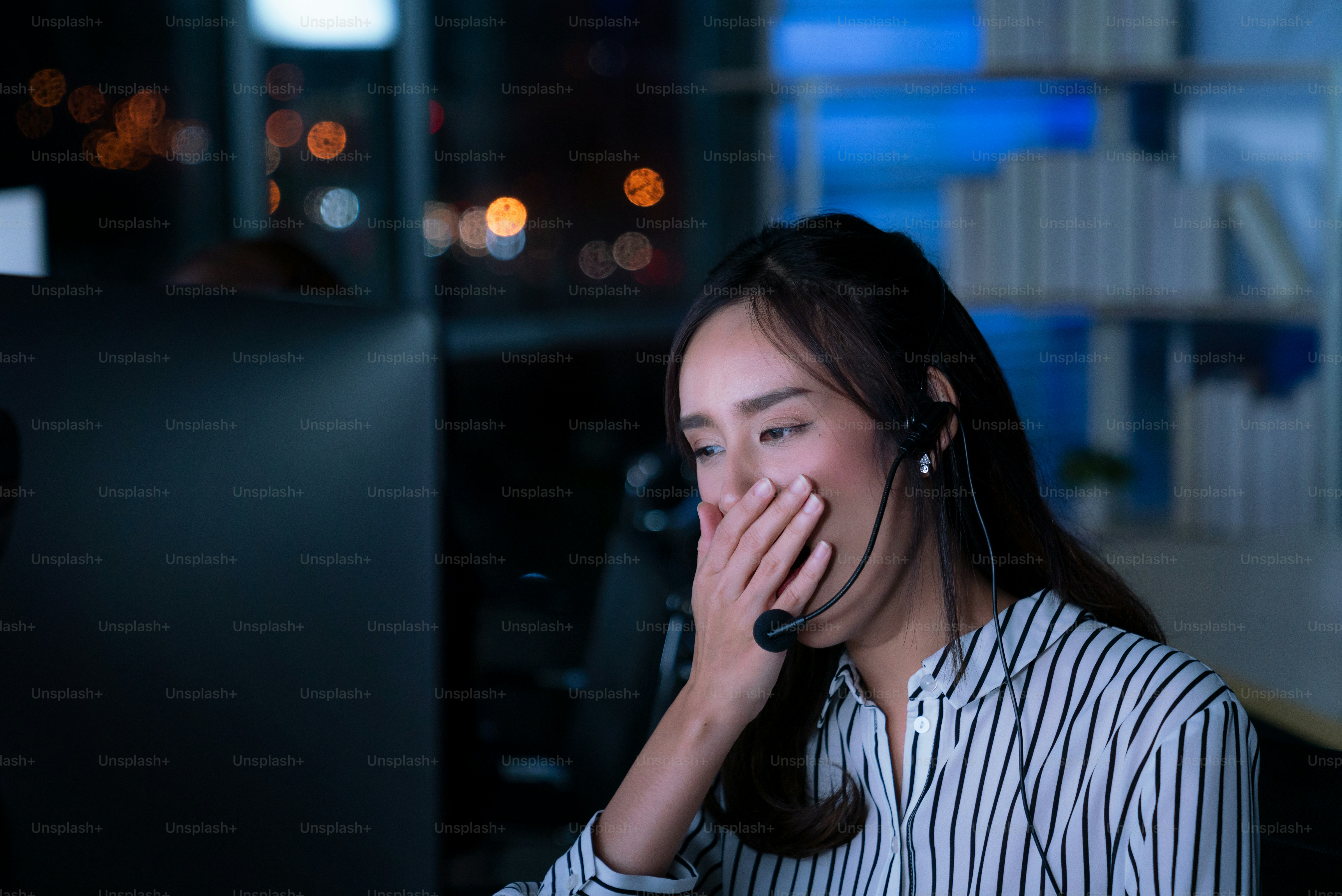 Thai asian call center business people get headache and migraine from ...