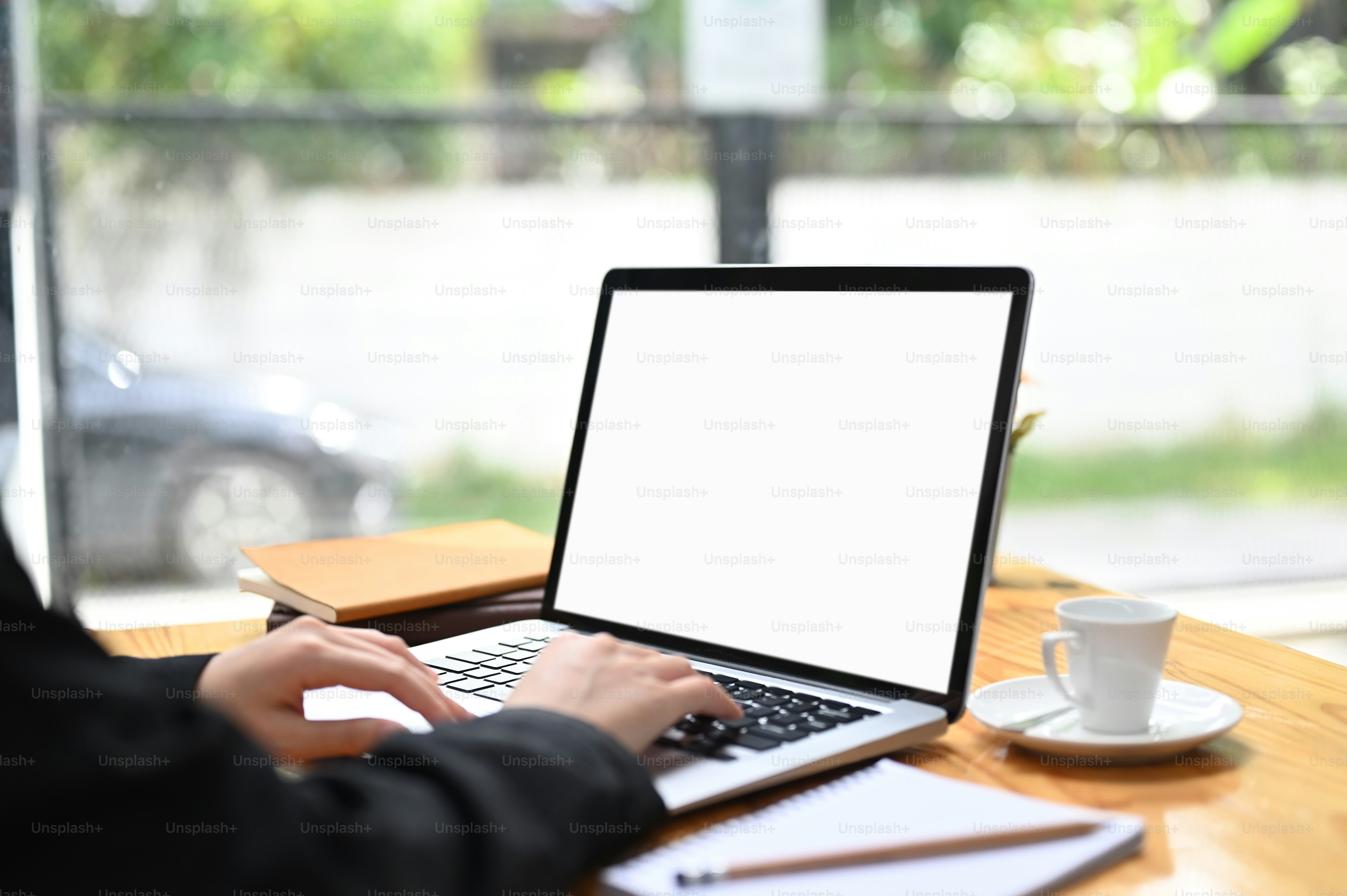 Close up woman typing laptop computer with empty screen. photo ...