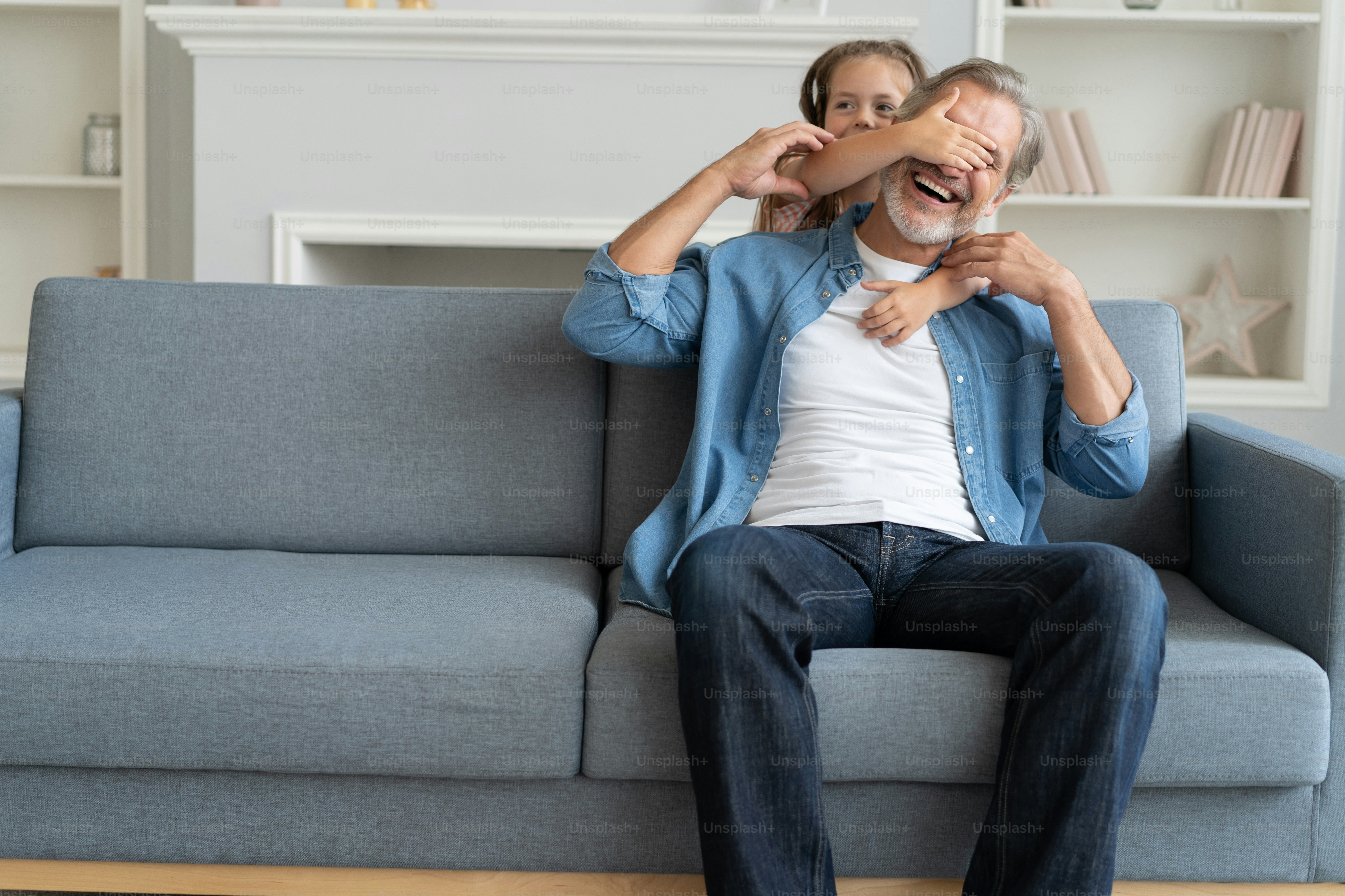 Happy sweet girl hugging her father at home photo – Joy Image on Unsplash