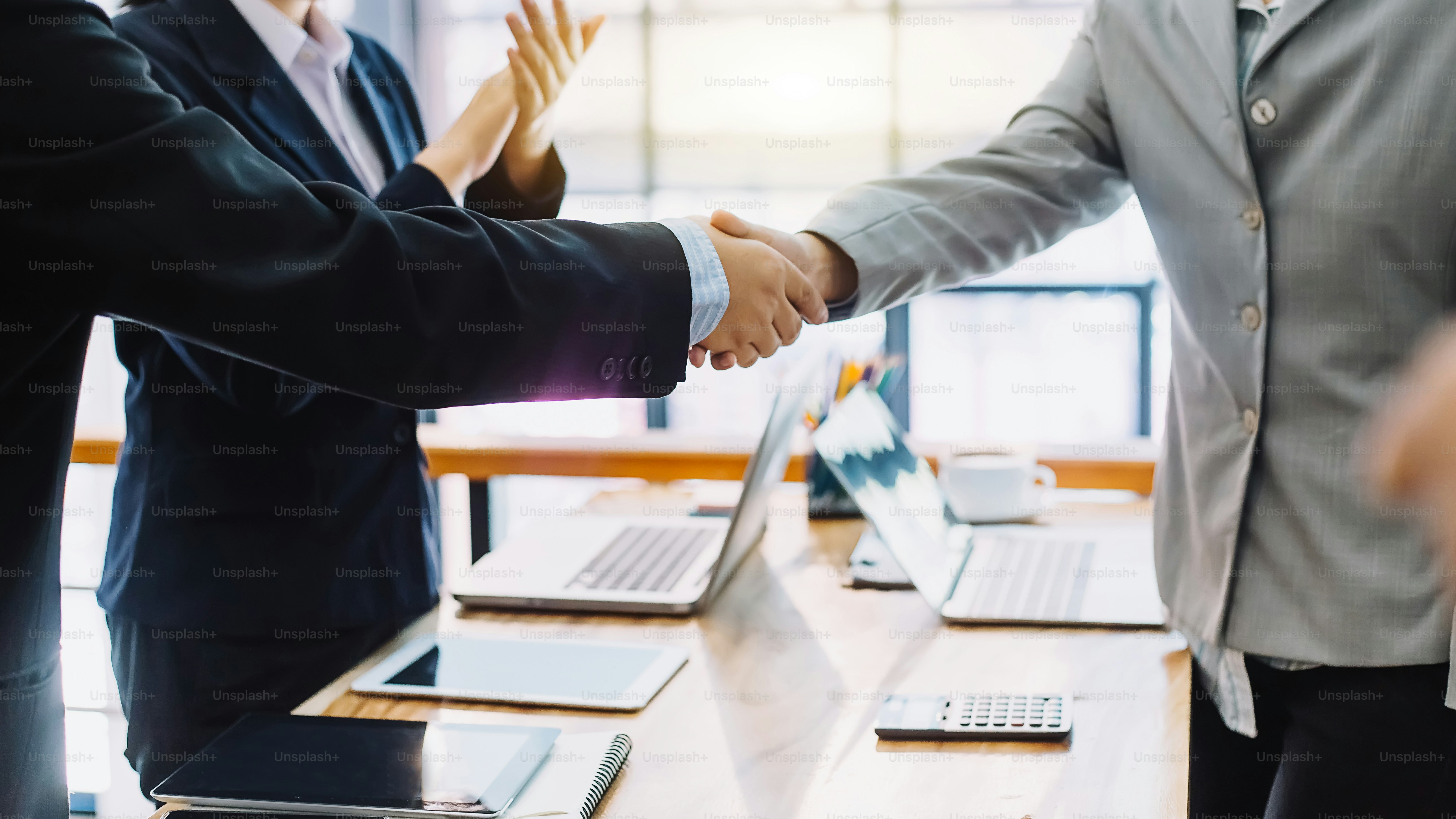 Business handshake. Business executives to congratulate the joint photo ...