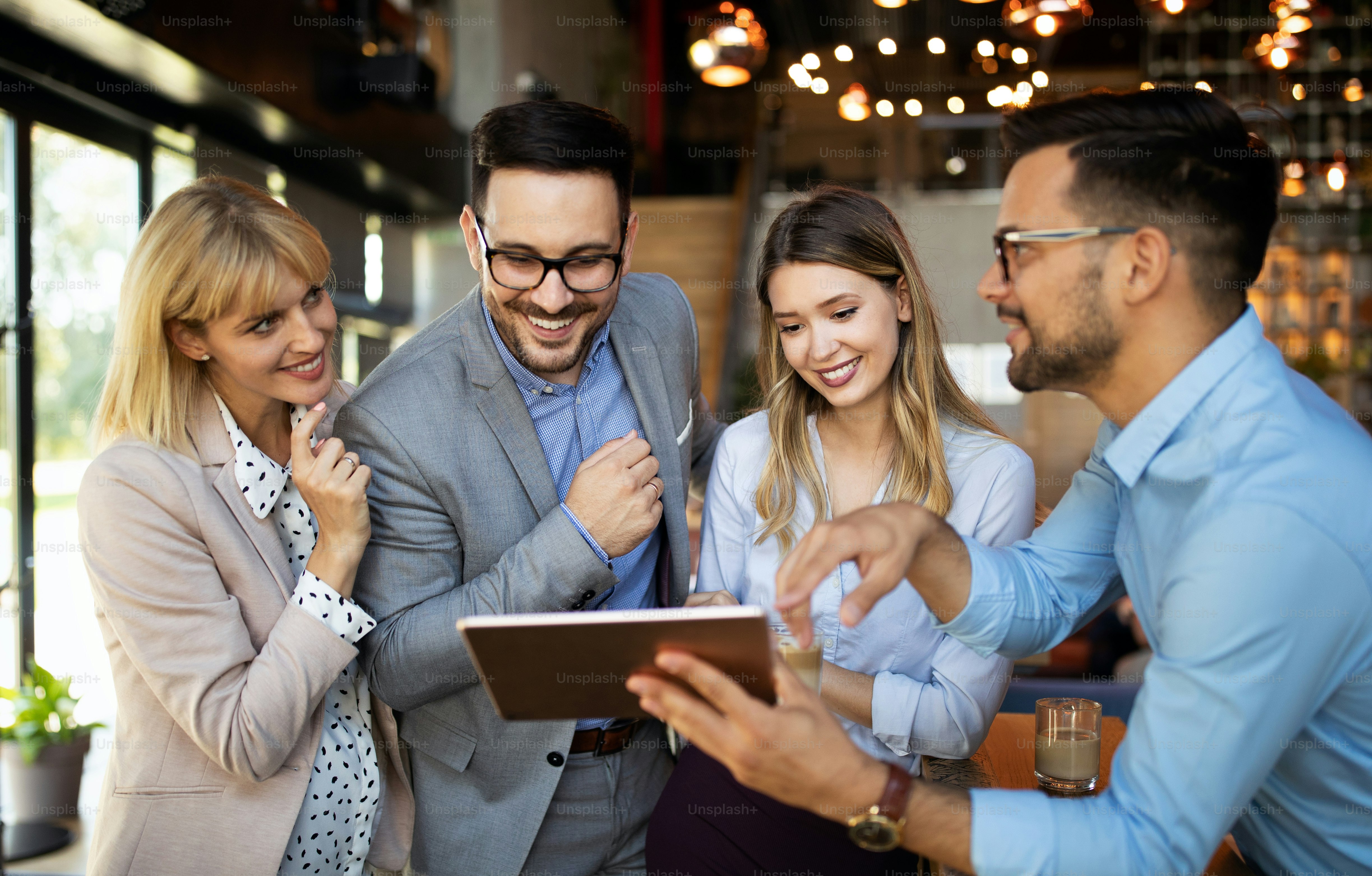 Successful company with happy business employees in modern office photo ...