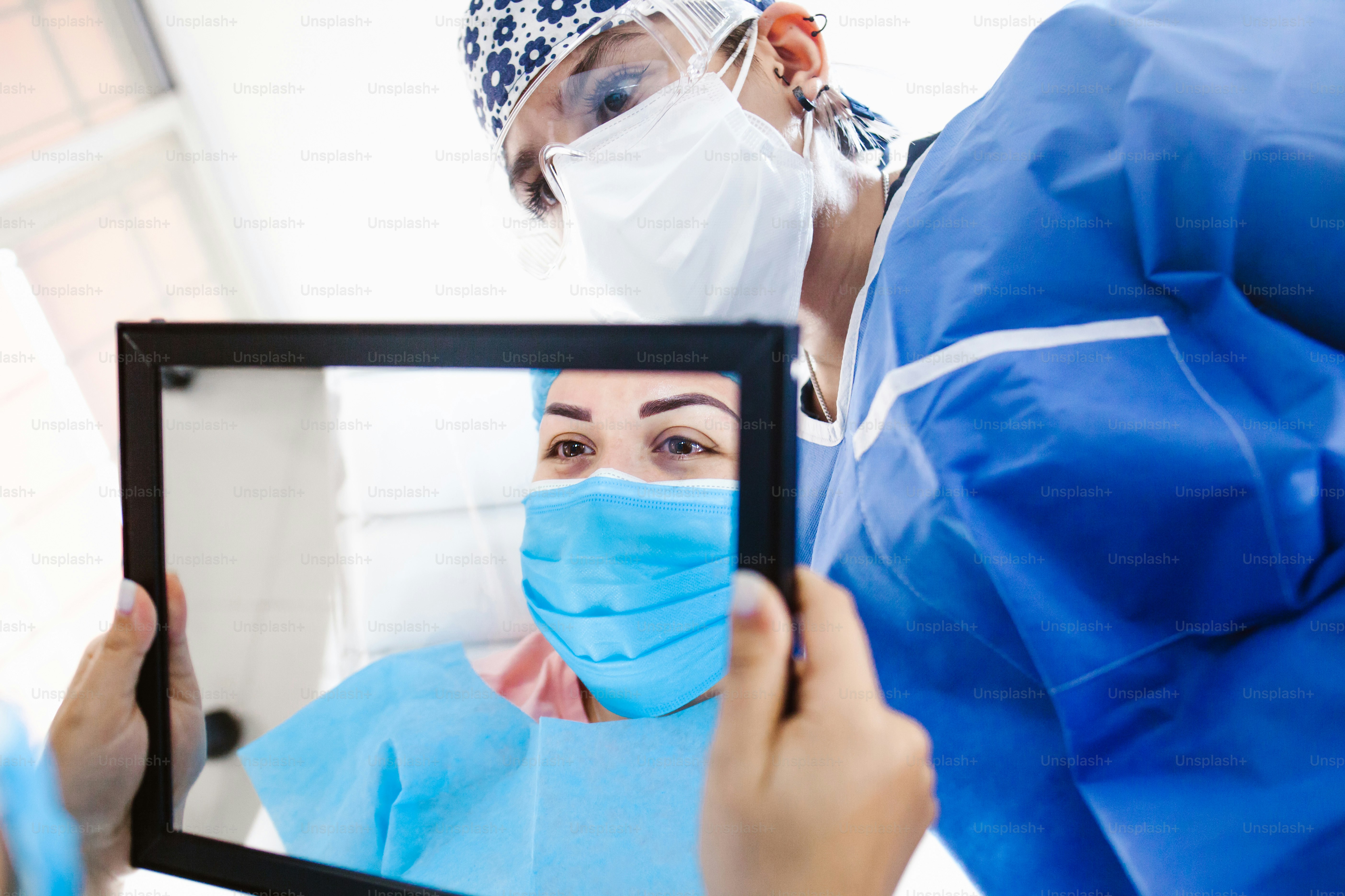 Latin woman Beautician Doing Eyebrow Tattooing For Female ...
