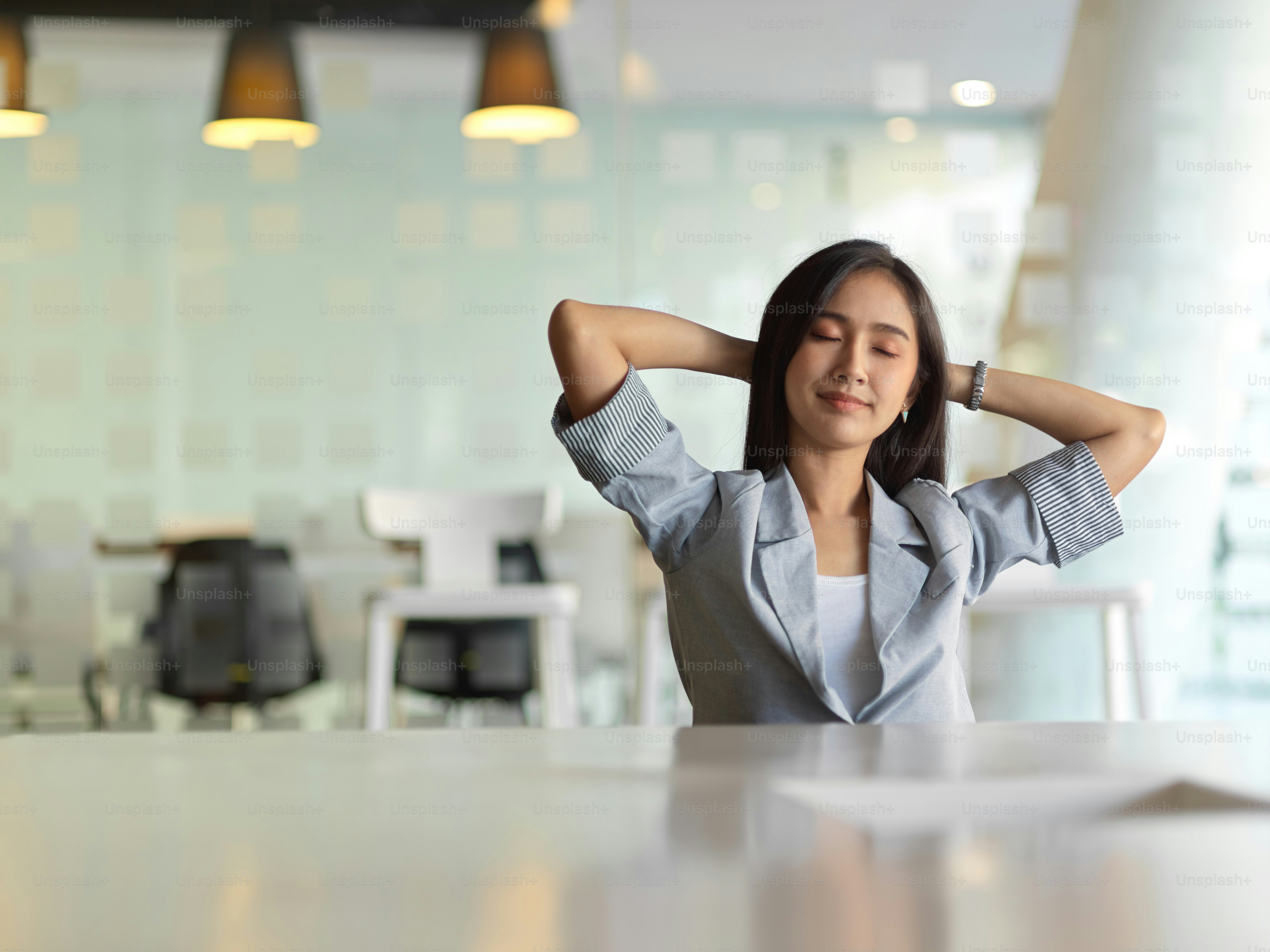 Portrait of businesswoman takes short time-out in office work, lying ...