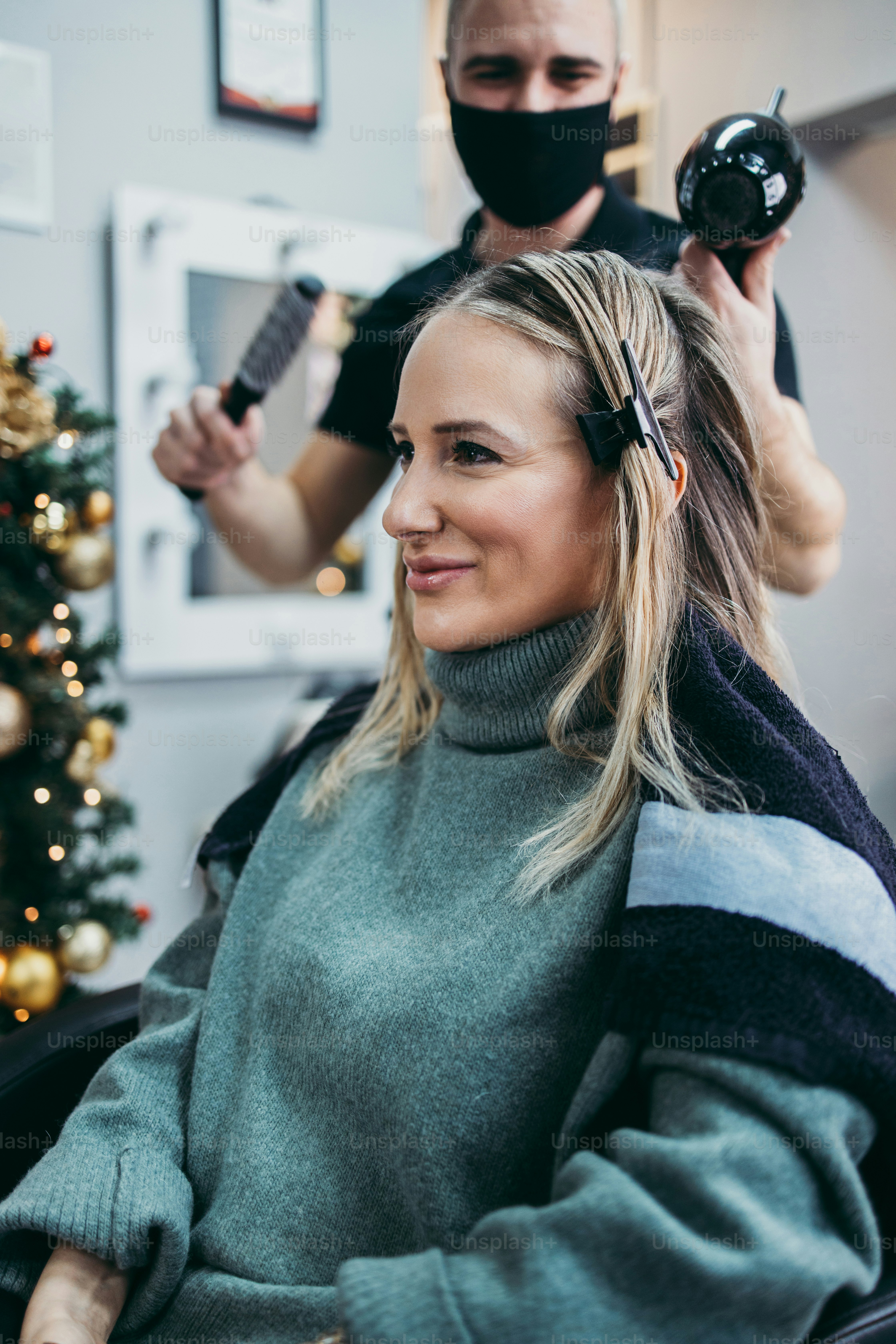 Beautiful hairstyle of woman after dyeing hair and making highlights in ...