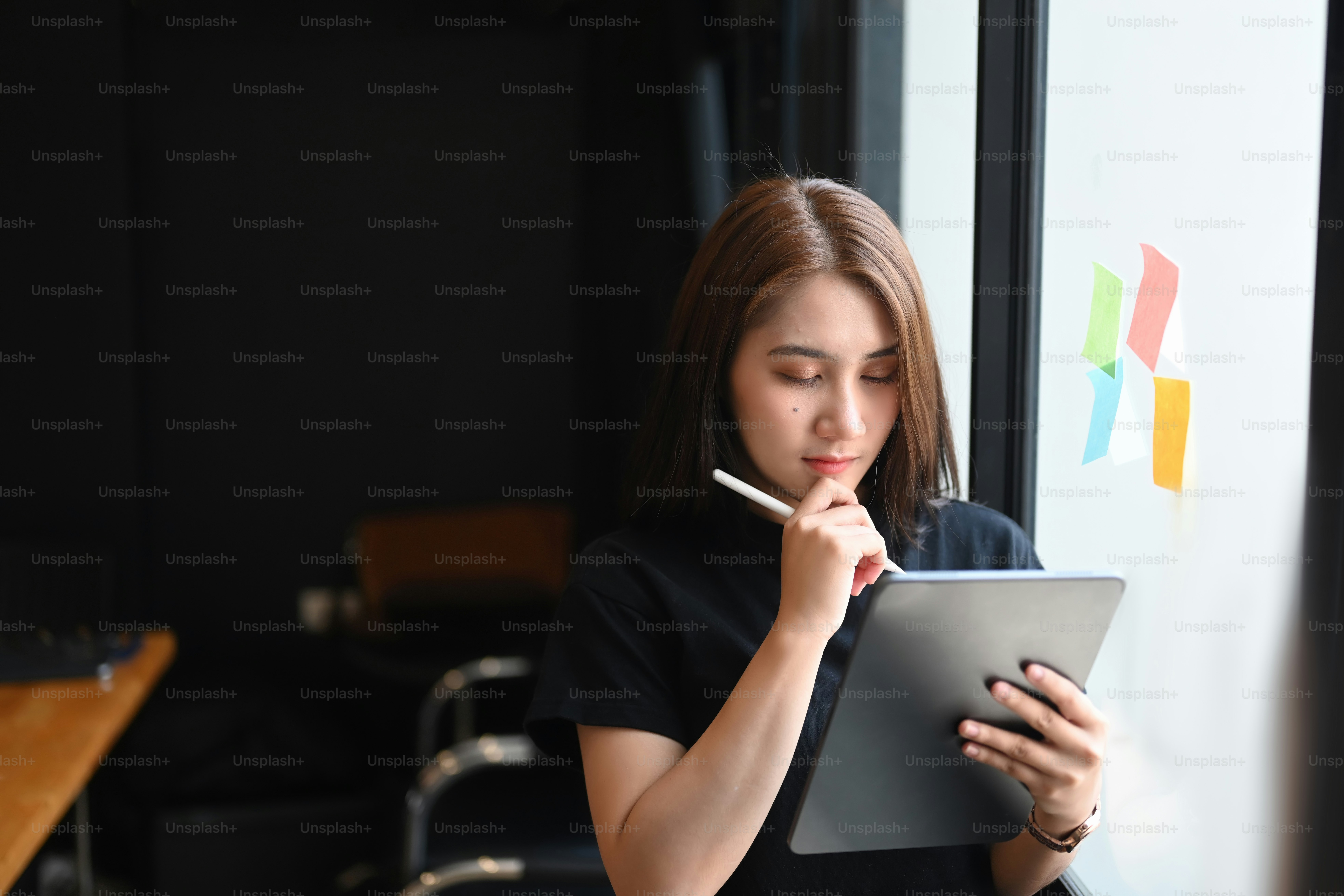 Business woman using digital tablet planning startup project and ...