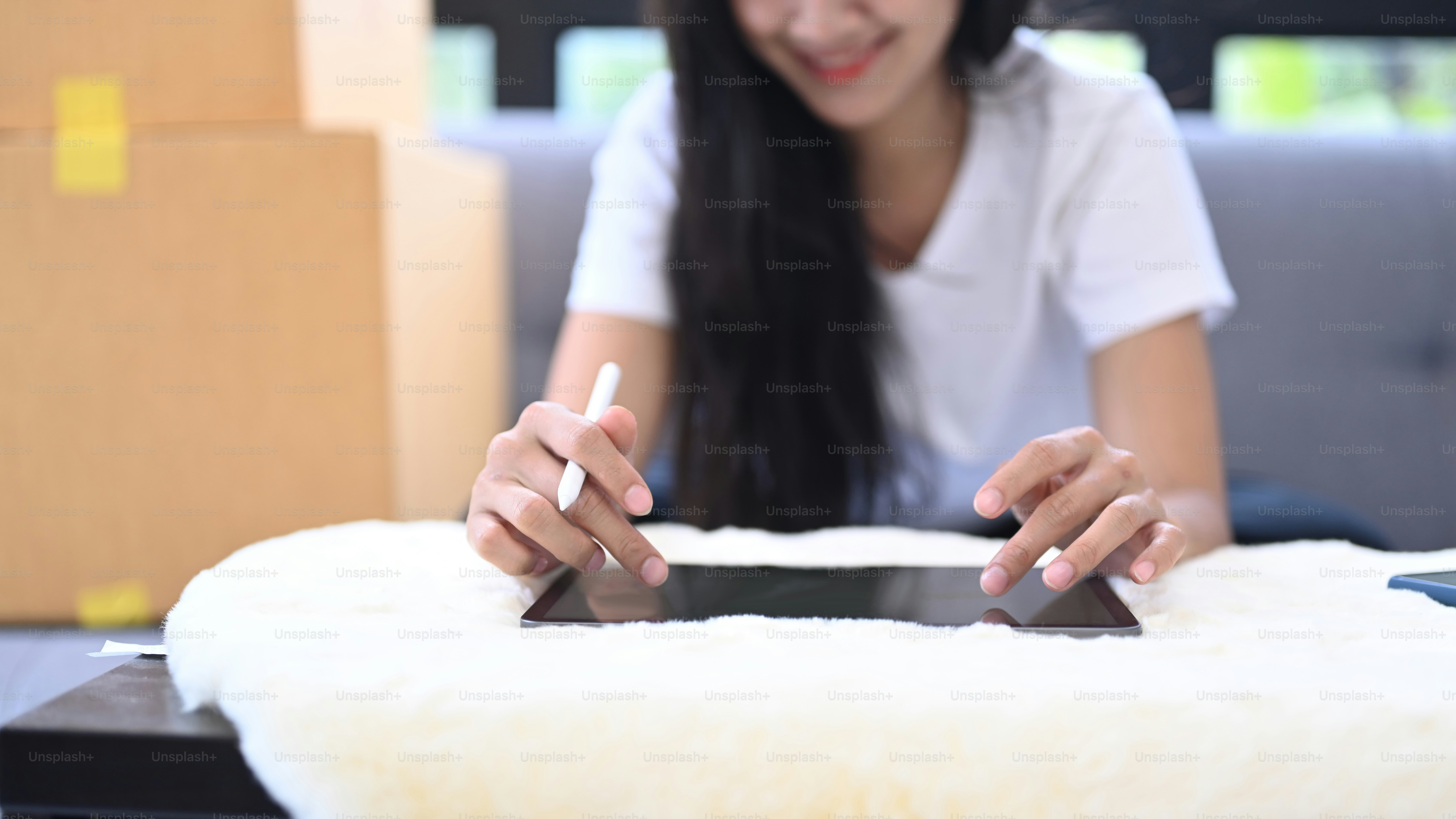 Cropped shot young startup entrepreneur small business owner using ...