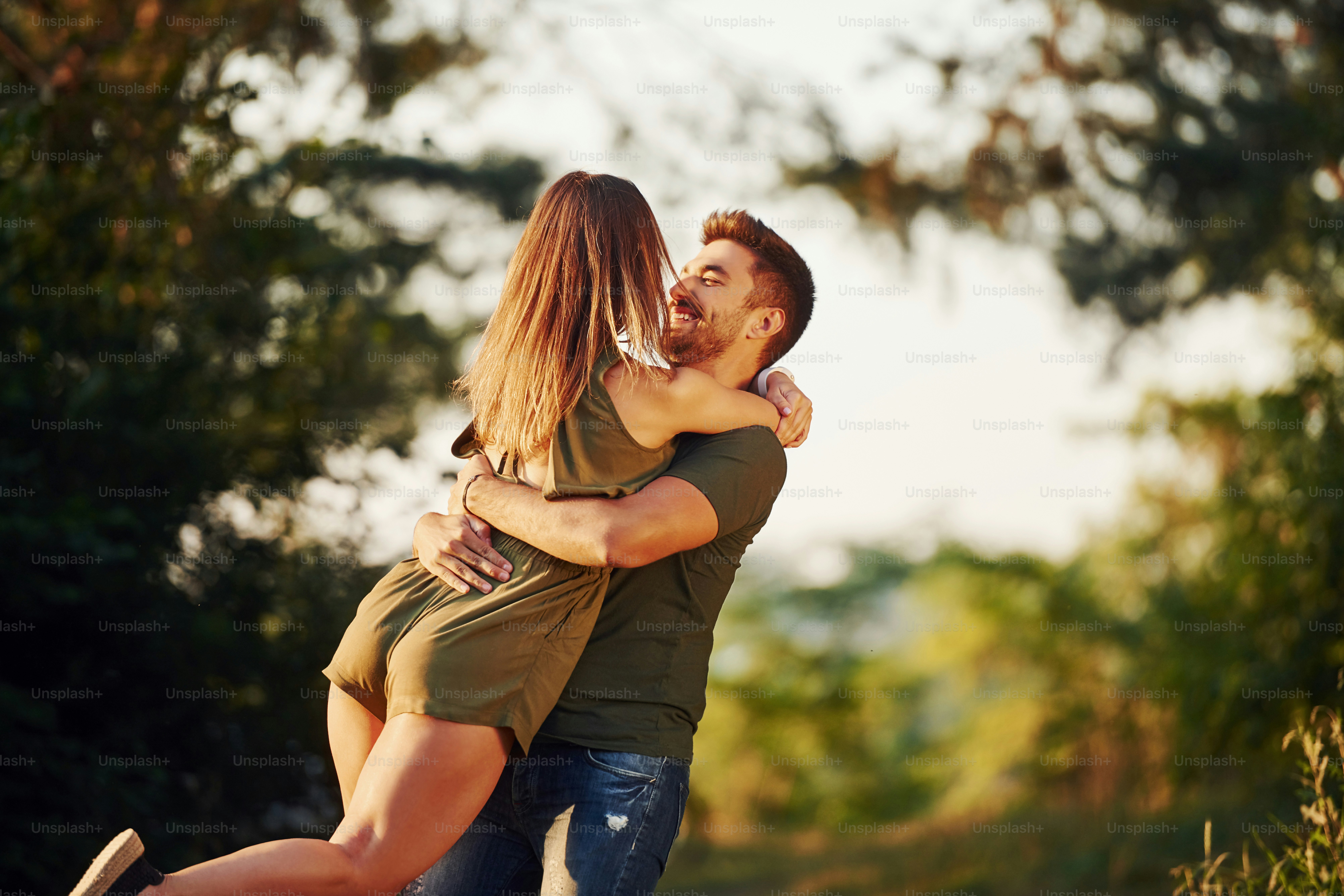 In love with each other. Beautiful young couple have a good time in the ...