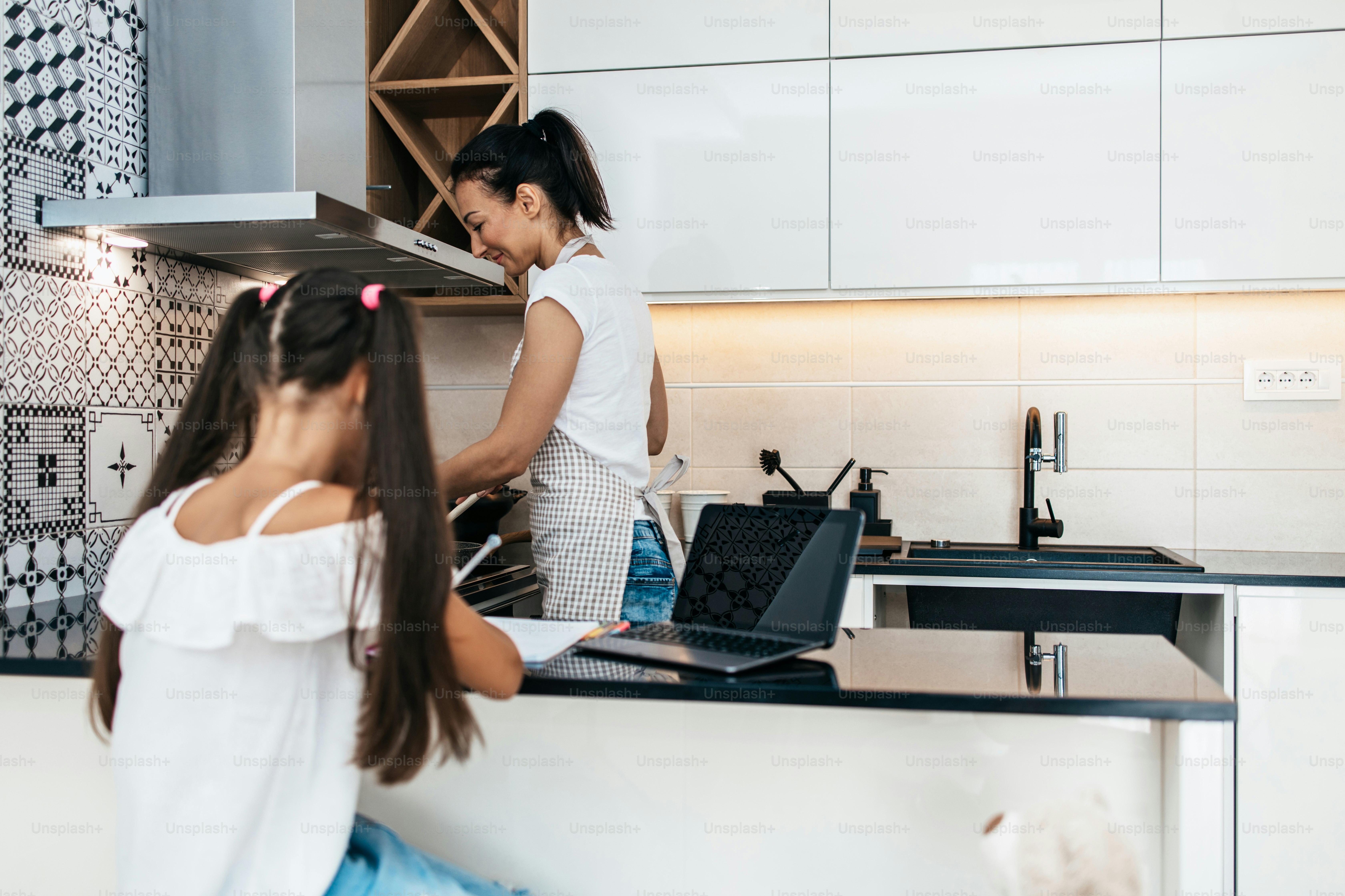 Young little girl having e-learning session during Covid-19 pandemic ...