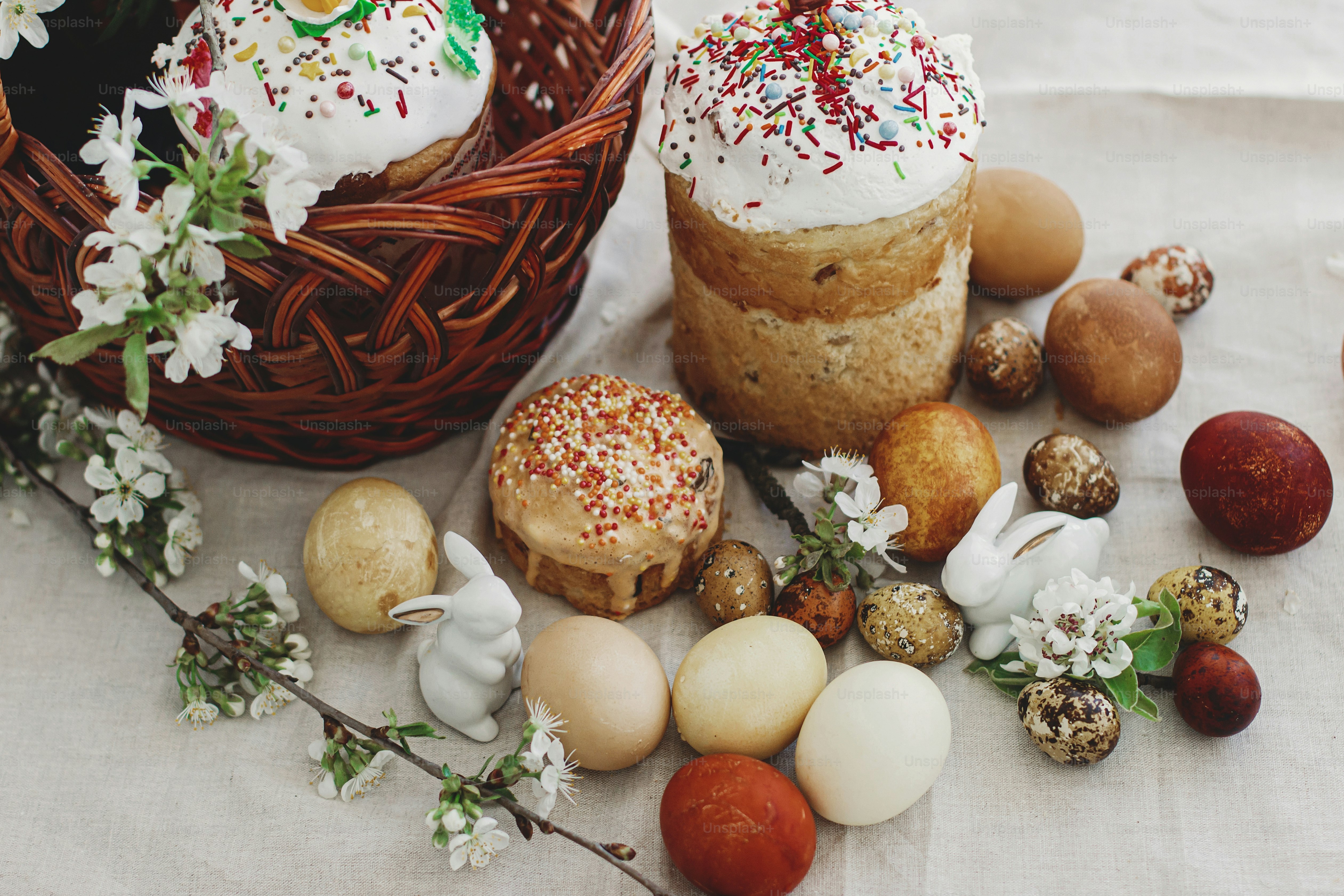 Modern easter eggs, Easter bread, wicker basket, bunny and blooming ...