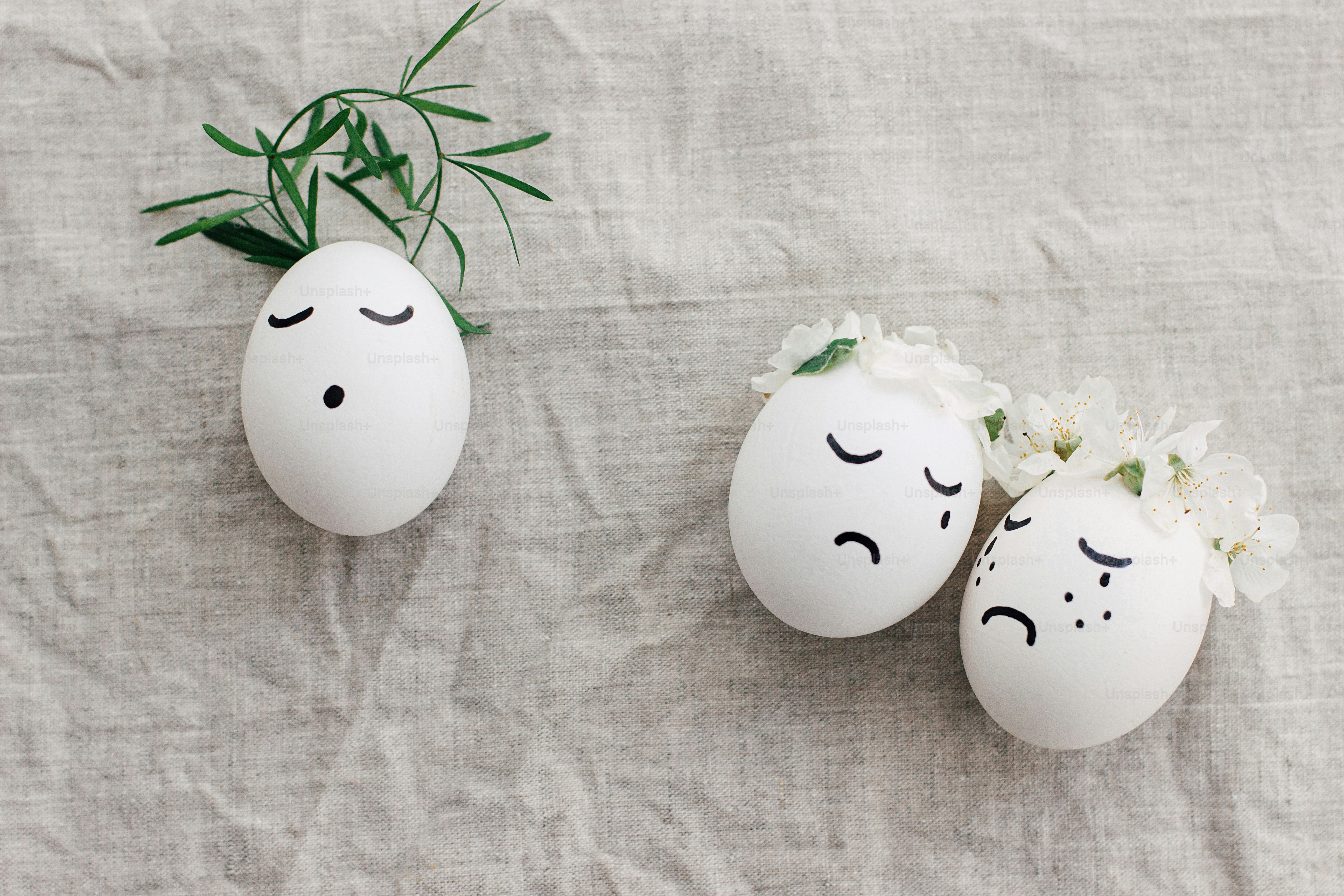 Easter concept. Natural eggs with sad crying and calm faces in cute ...