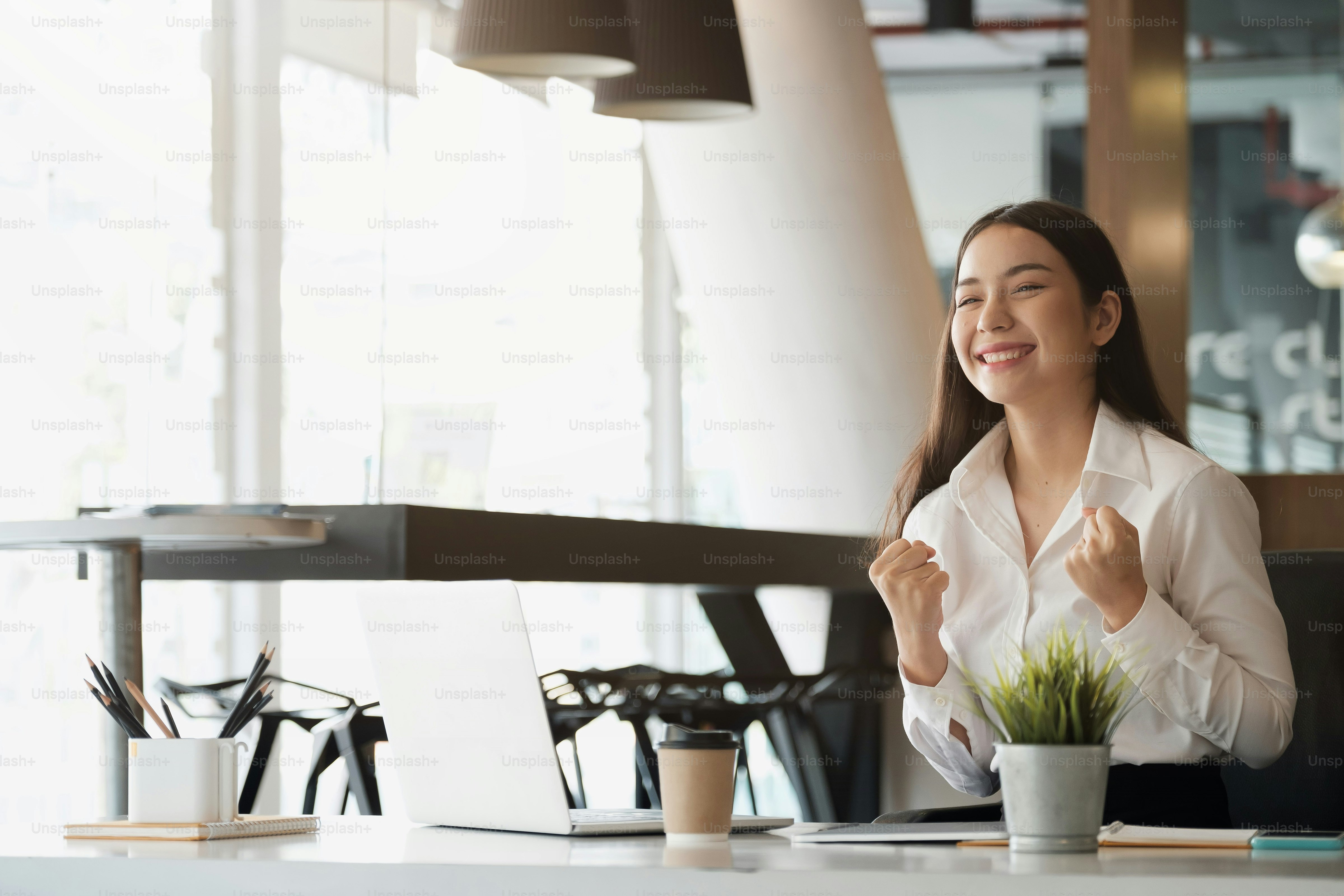 Business Winner - Happy excited successful businesswoman triumphing in ...