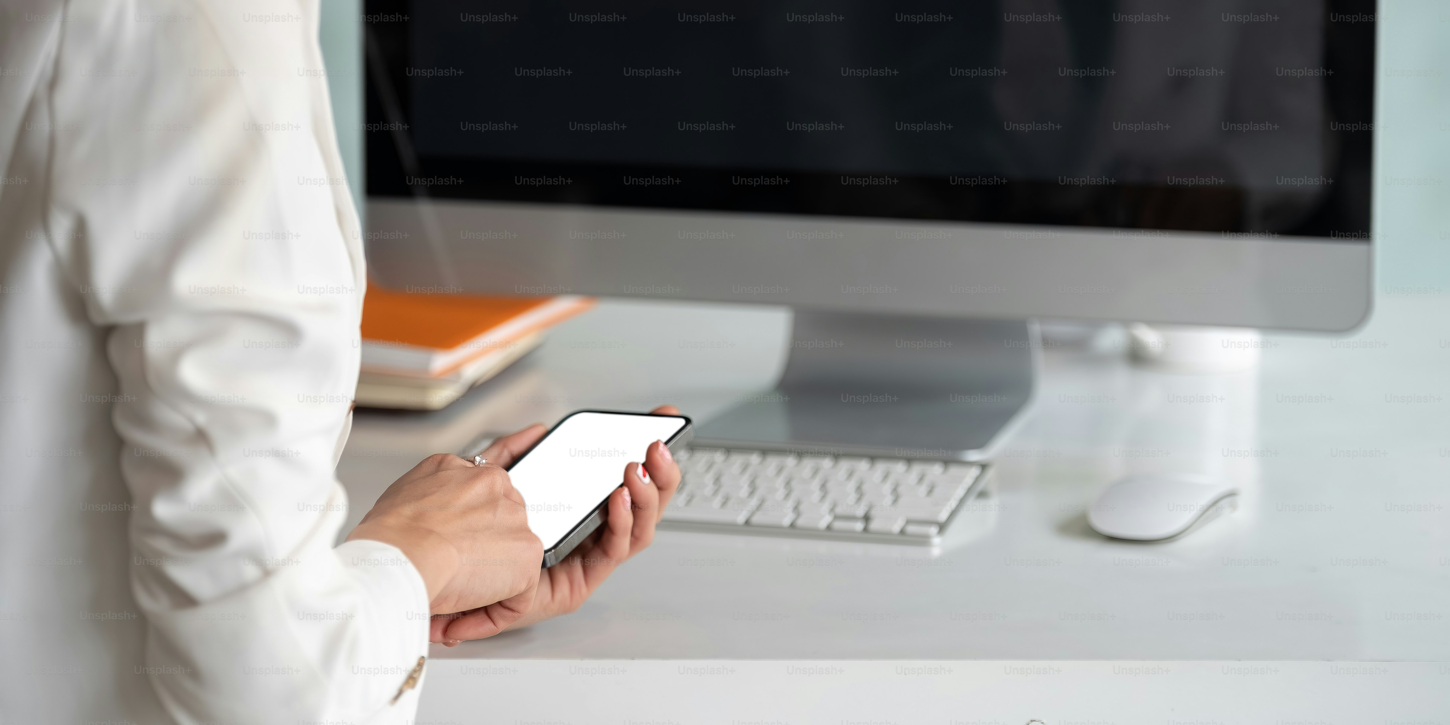 Close up woman use of smart phone at office photo – Employee engagement ...