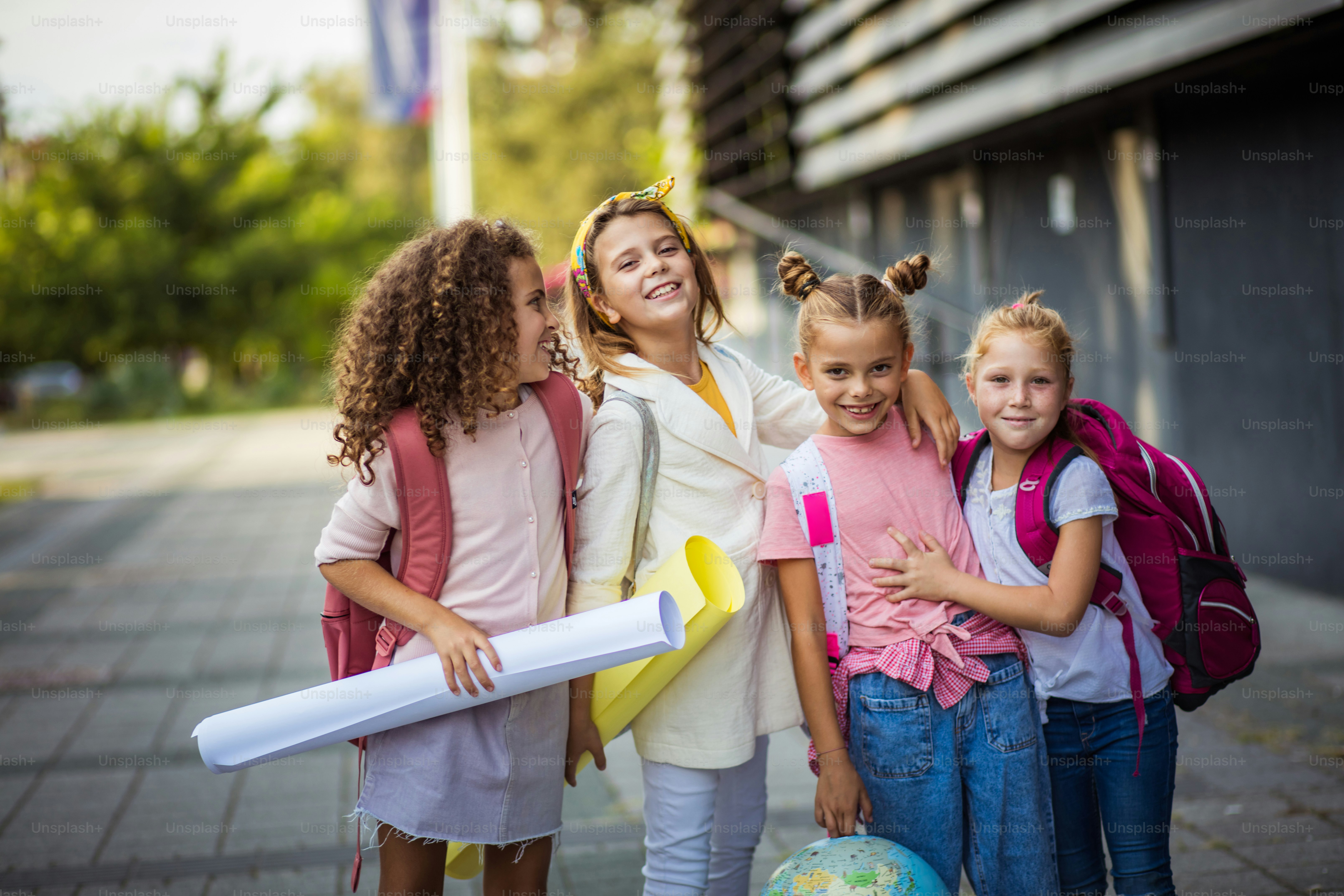 Three school girls outside. photo – Back to school Image on Unsplash