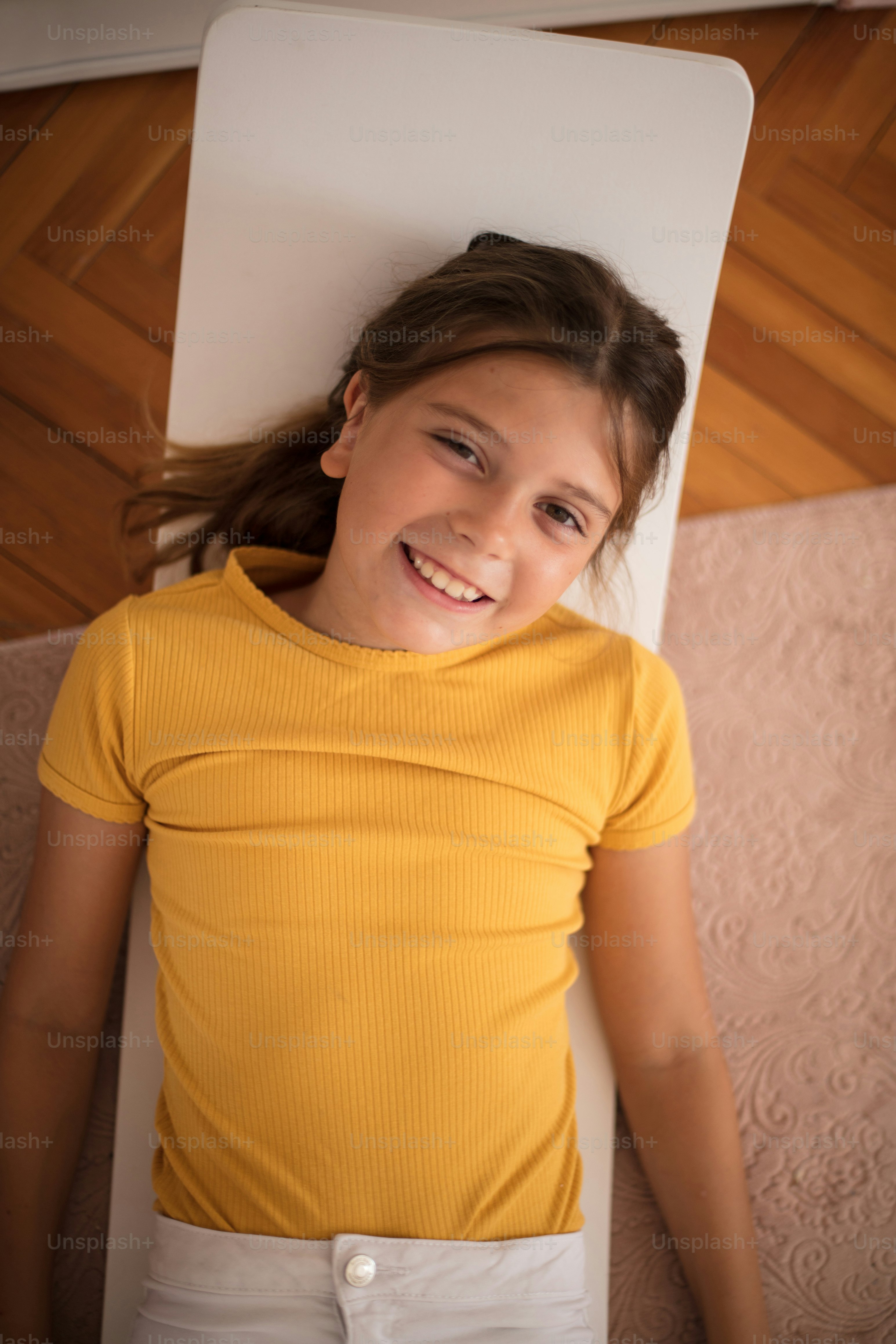 Little girl having fun in her bedroom. Little girl on board. photo ...