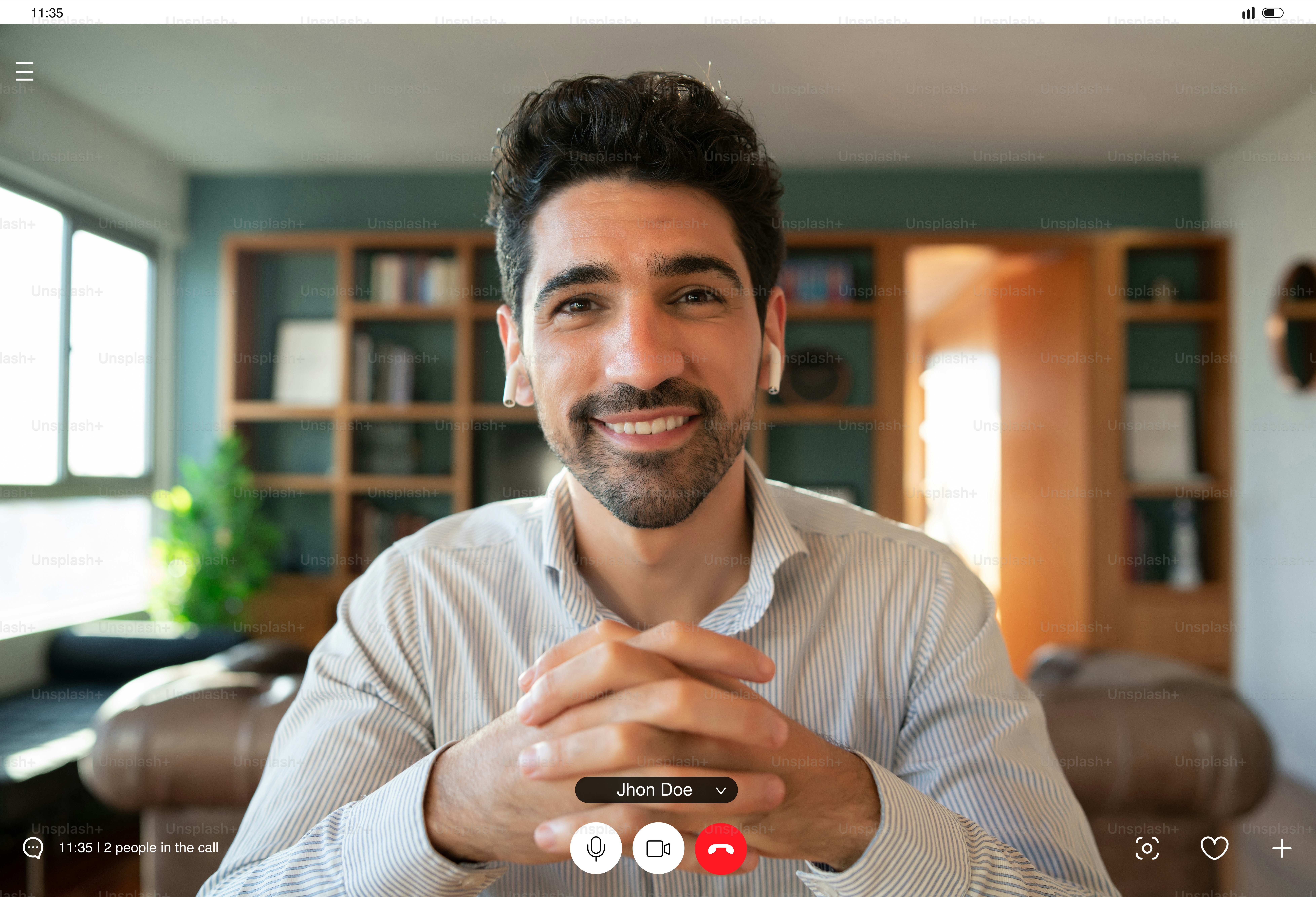 Portrait of young business man on a work video call while staying at ...