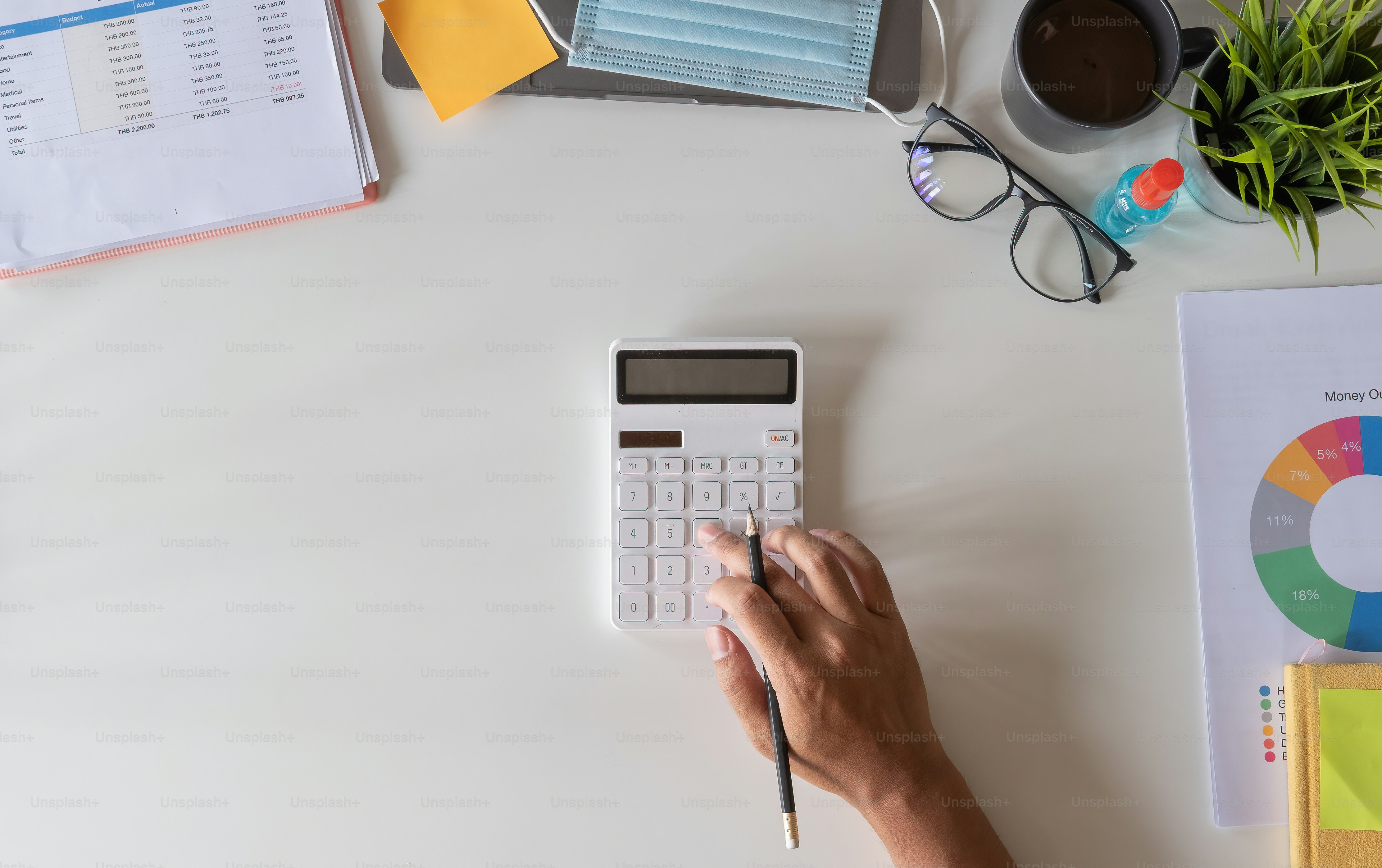 Top view hand of accountant using calculator on workplace with copy ...