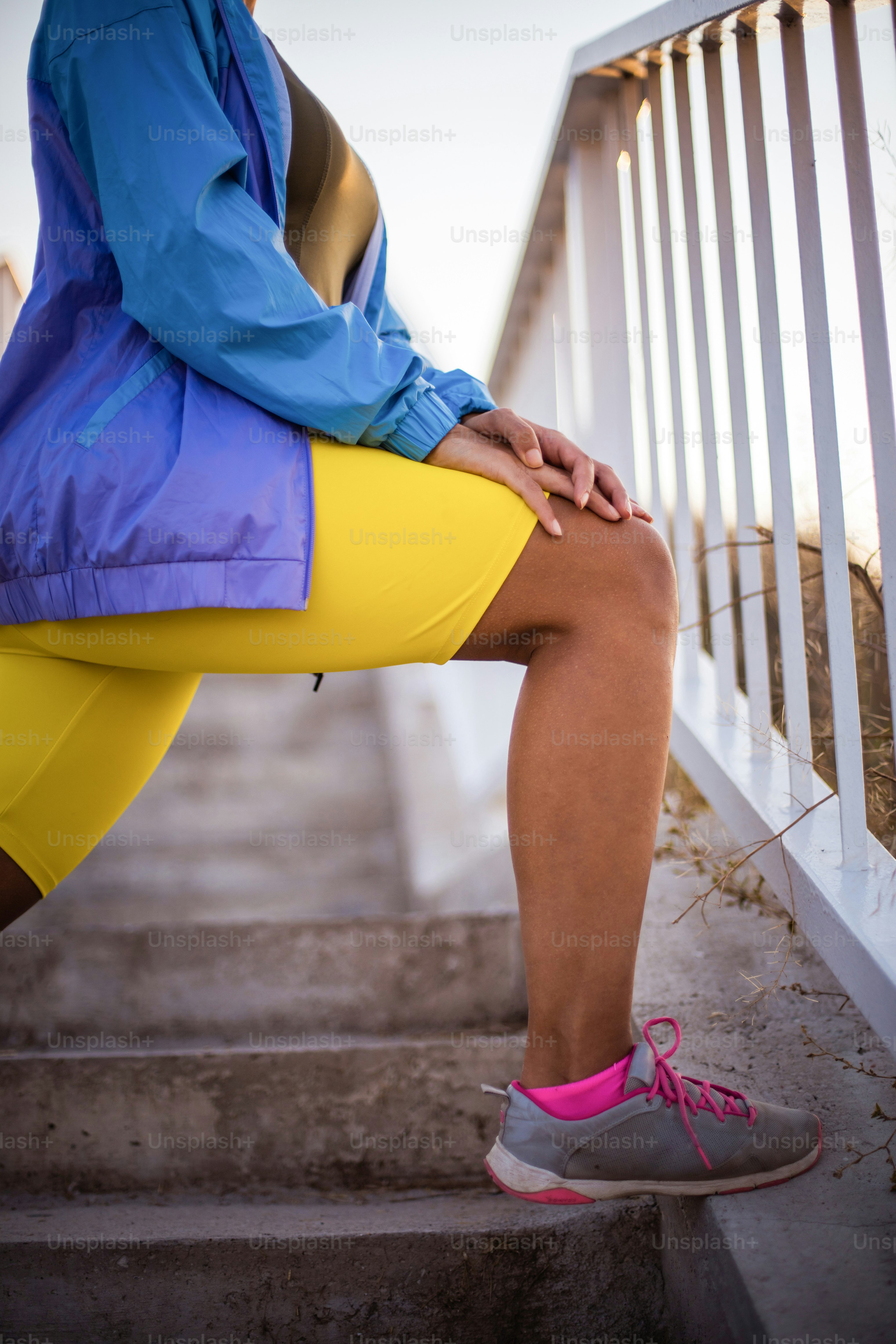 Legs of African sports woman on the stairs. photo – Serbia Image on ...
