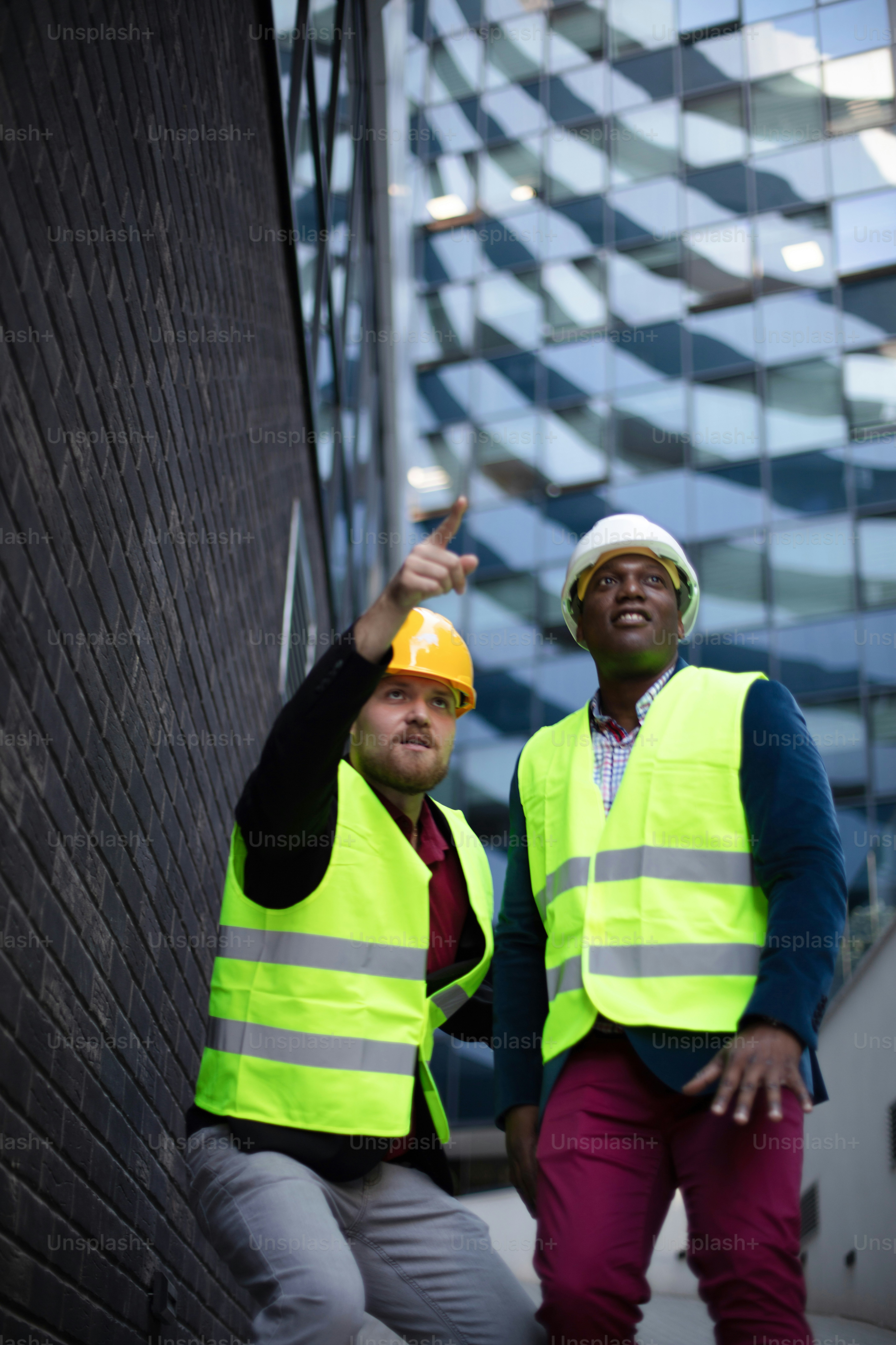 Engineer discussing the structure of the building with architects ...