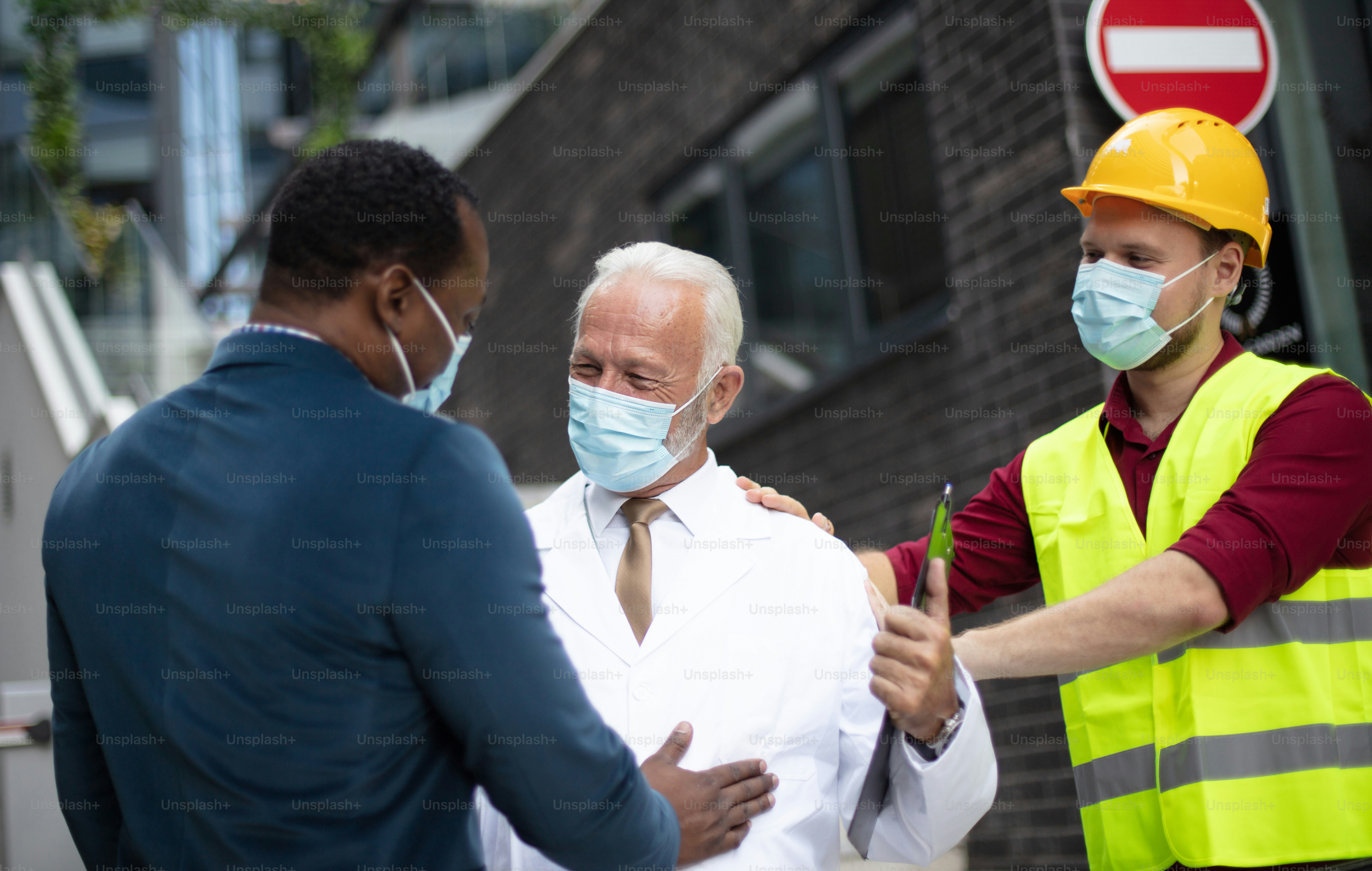 Business man, doctor and engineer on street. photo – Serbia Image on ...