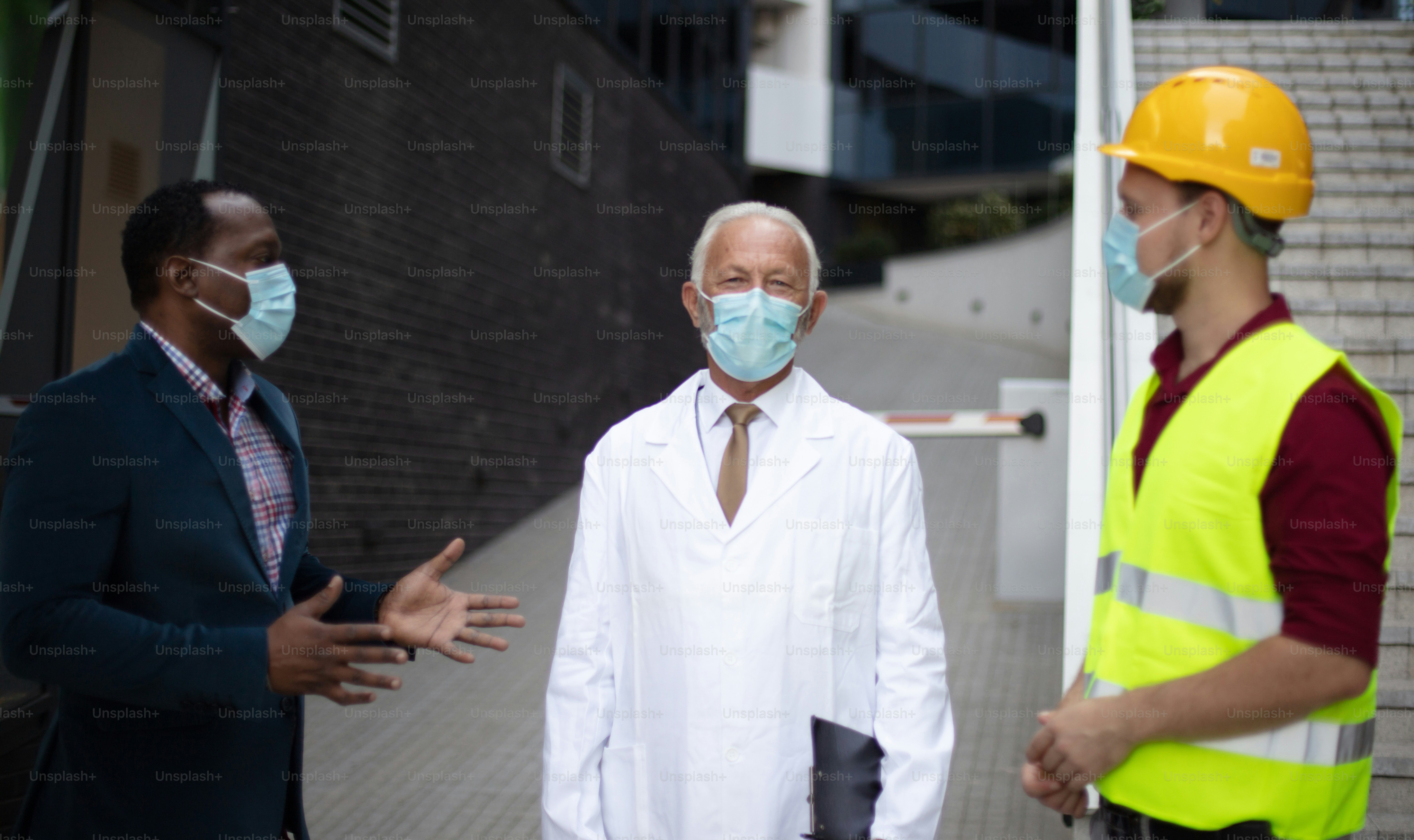Business man, doctor and engineer on street. photo – Serbia Image on ...