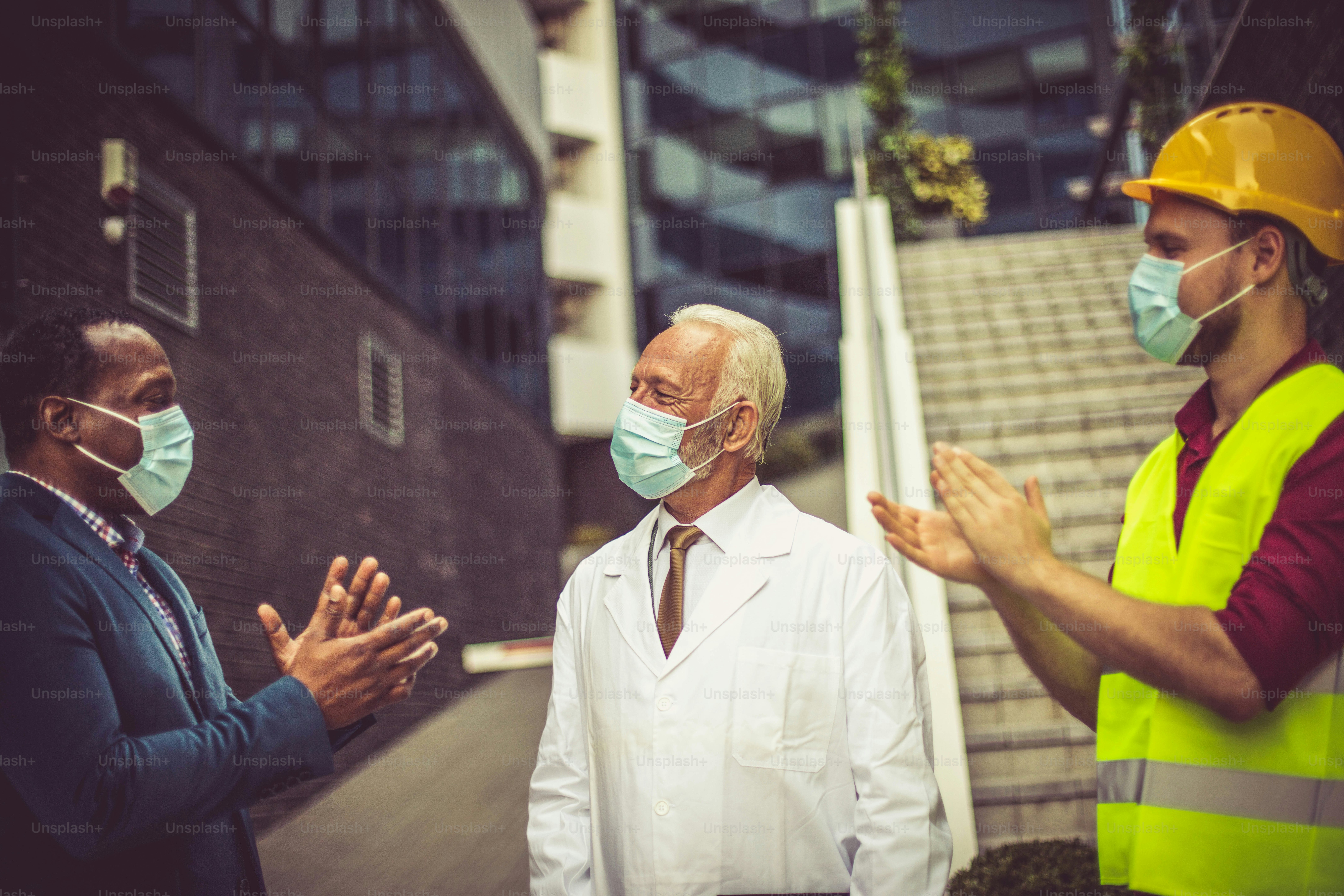 Business man, doctor and engineer on street. photo – Serbia Image on ...