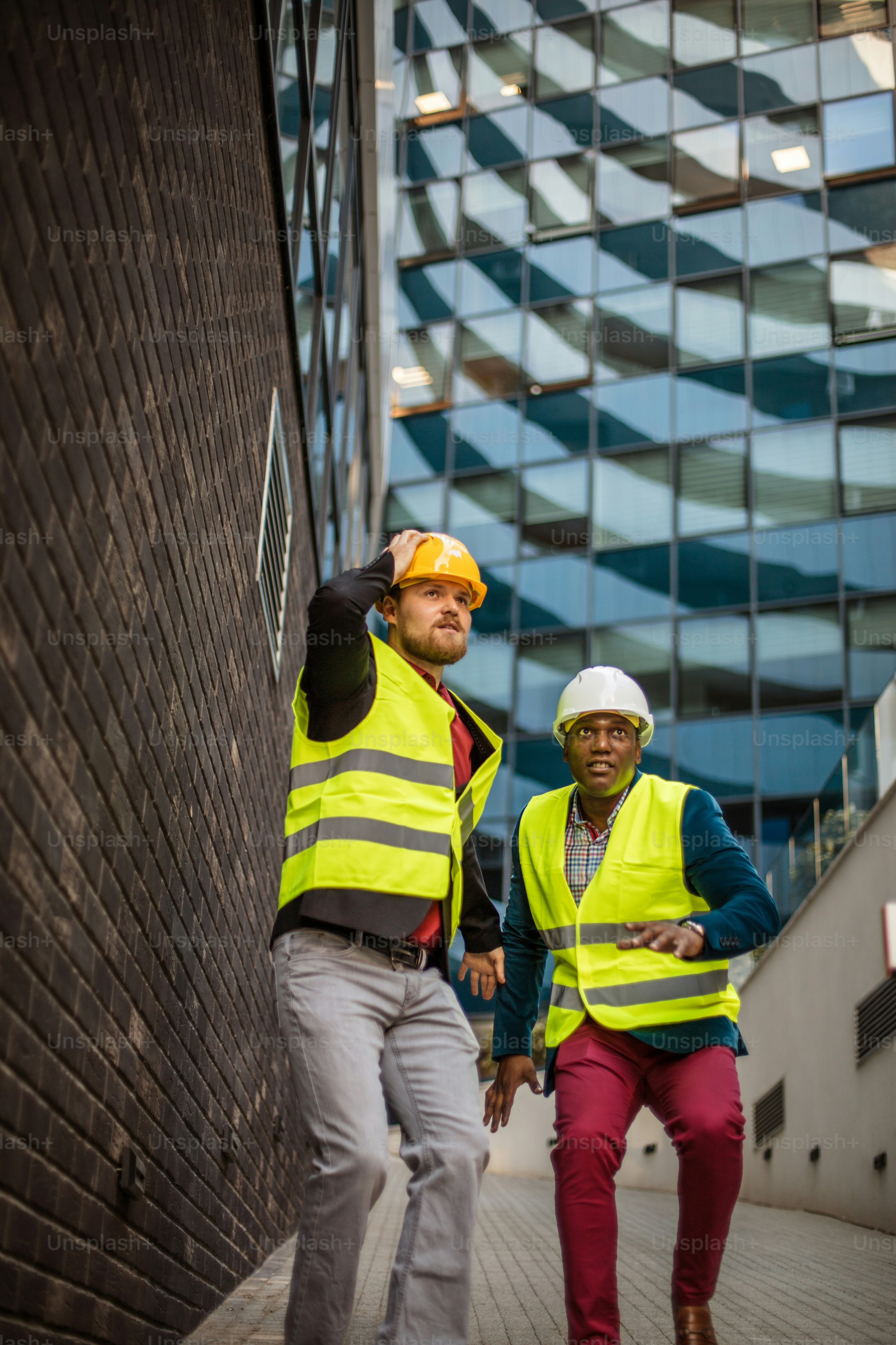 Engineer discussing the structure of the building with architects ...